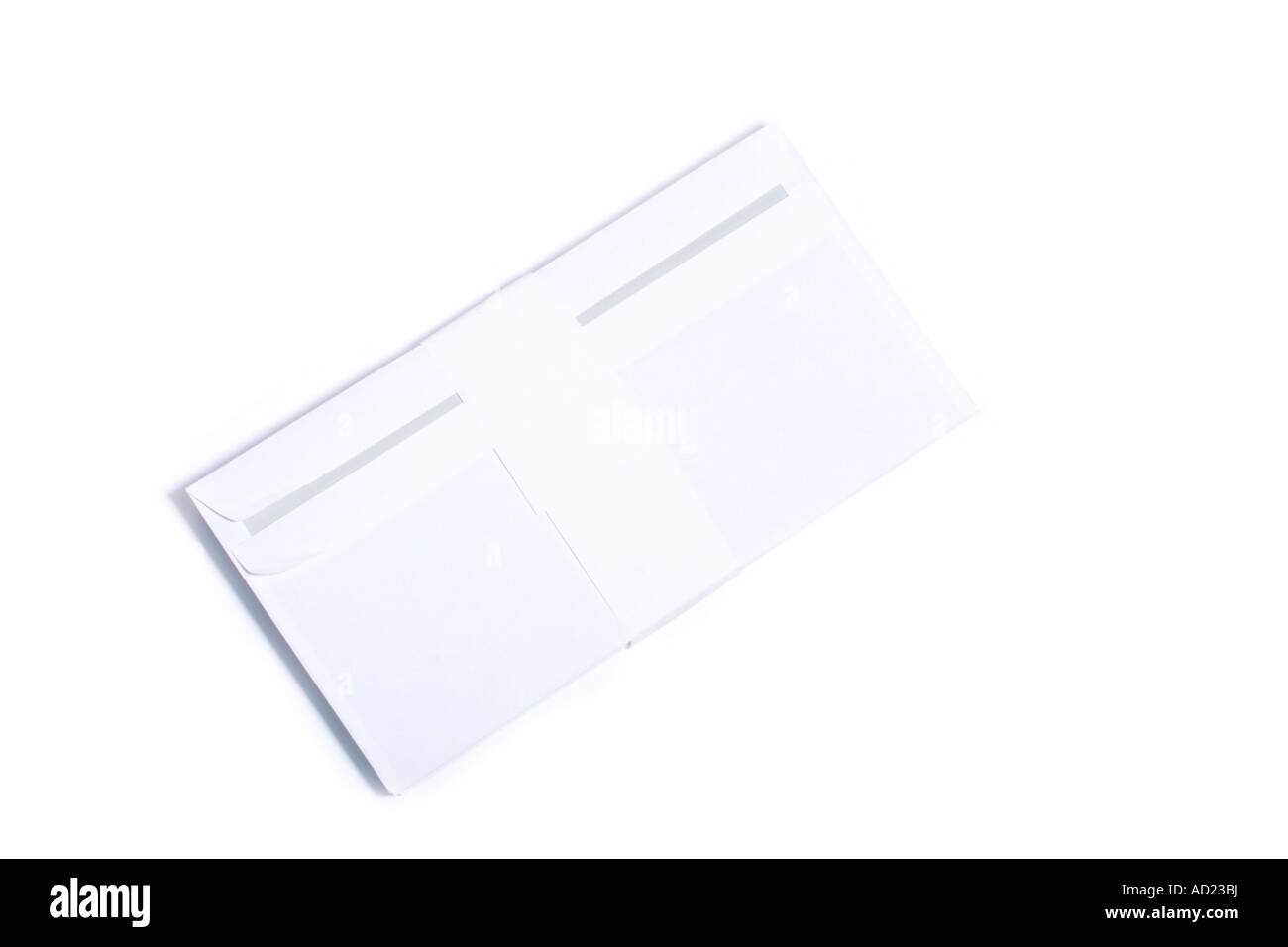 Two plain white envelopes placed diagonally, isolated on a clean white ...