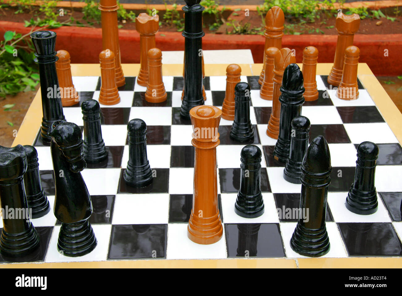 Chess board sports game with the chess board made of ceramic tiles and ...