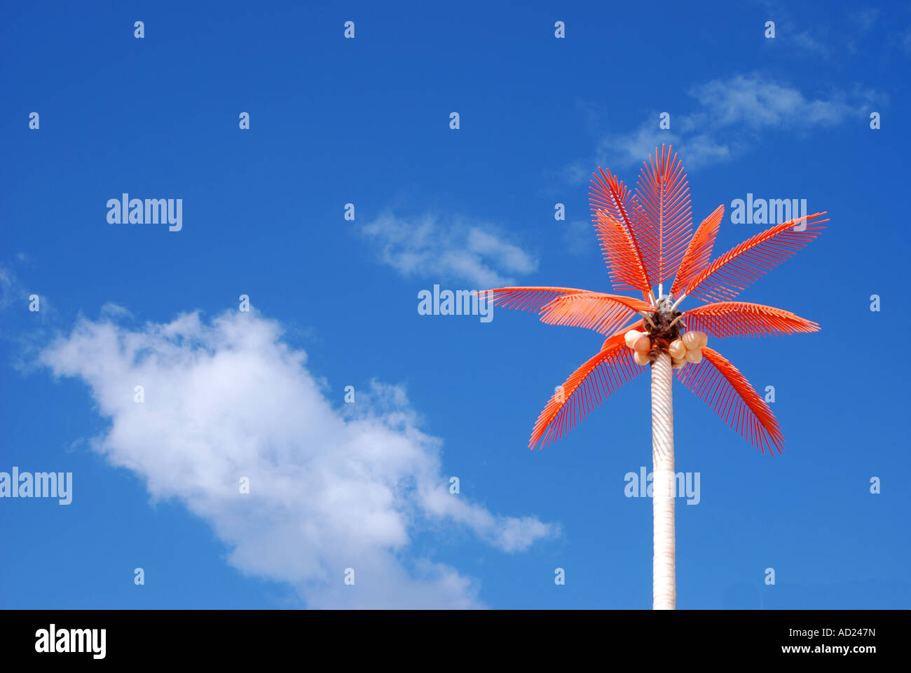 plastic palm tree sky clouds unnatural fake Stock Photo - Alamy
