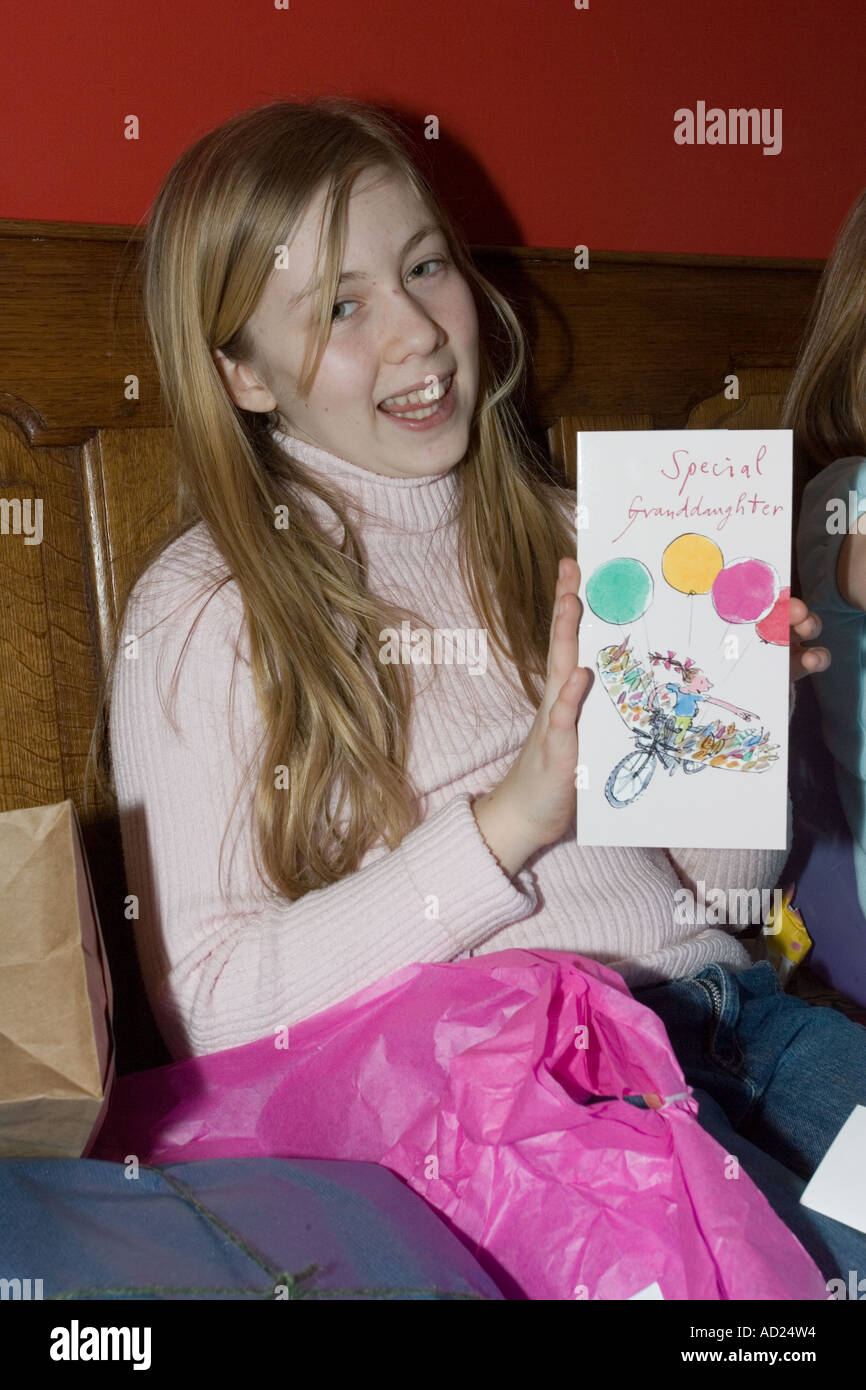 Jess with 12th birthday card Stock Photo - Alamy