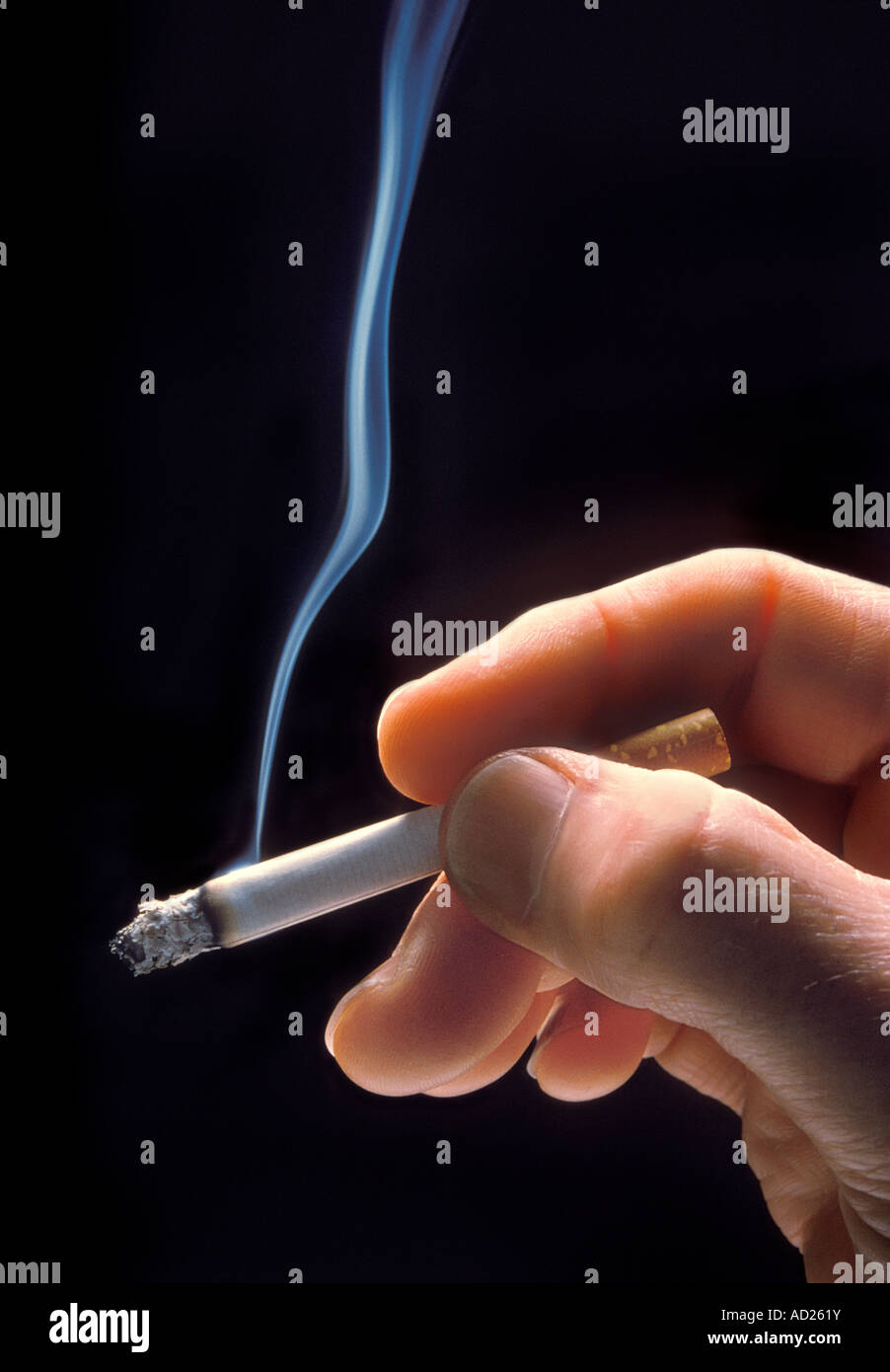 Lighted cigarette hi-res stock photography and images - Alamy