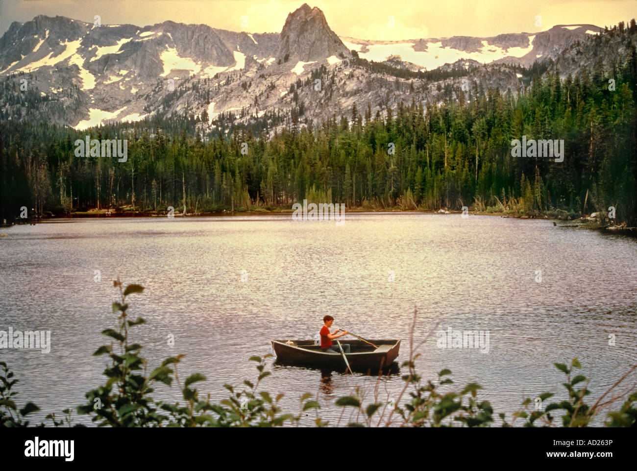boy rowing boat Mammoth Lakes California USA Stock Photo - Alamy