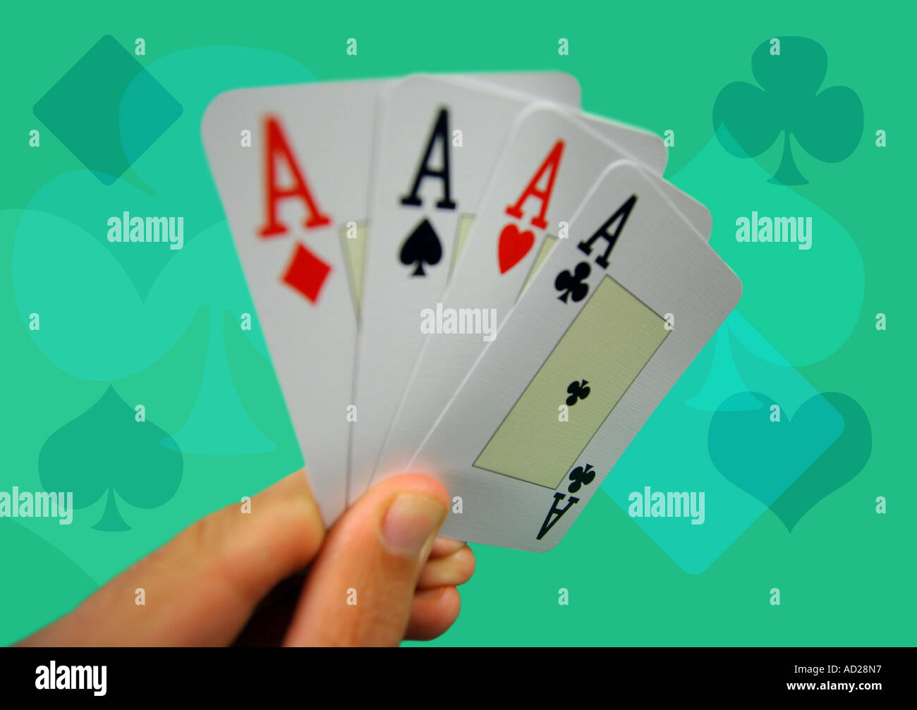 hand holding four aces playing cards Stock Photo - Alamy