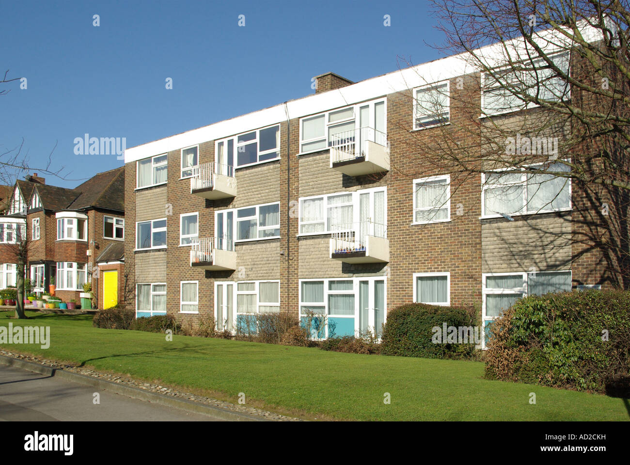 Typical small block of flats in suburbia Stock Photo - Alamy