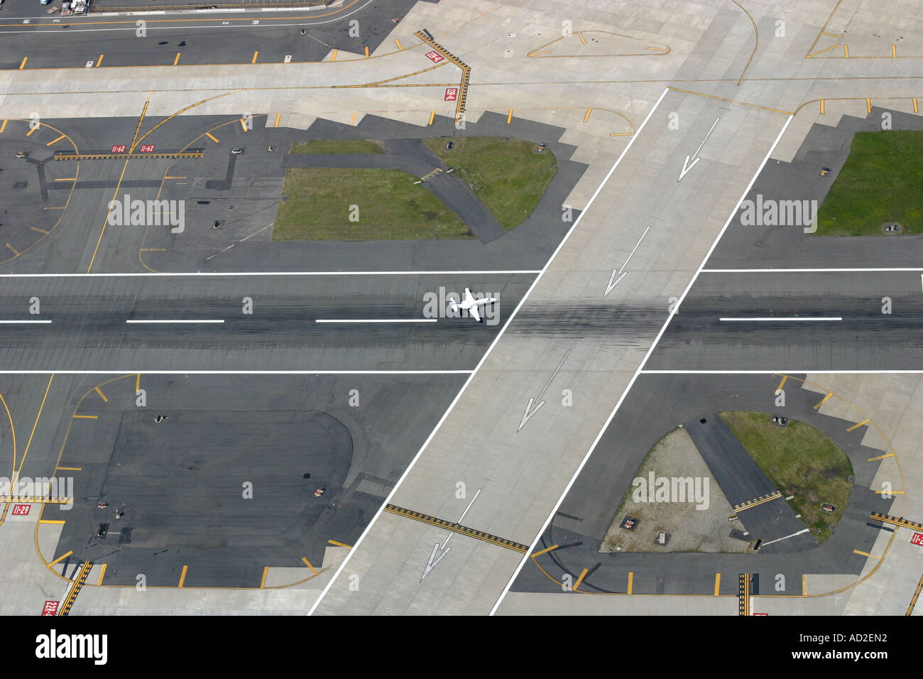 Aerial view of runway and taxiway intersection at Newark Liberty ...