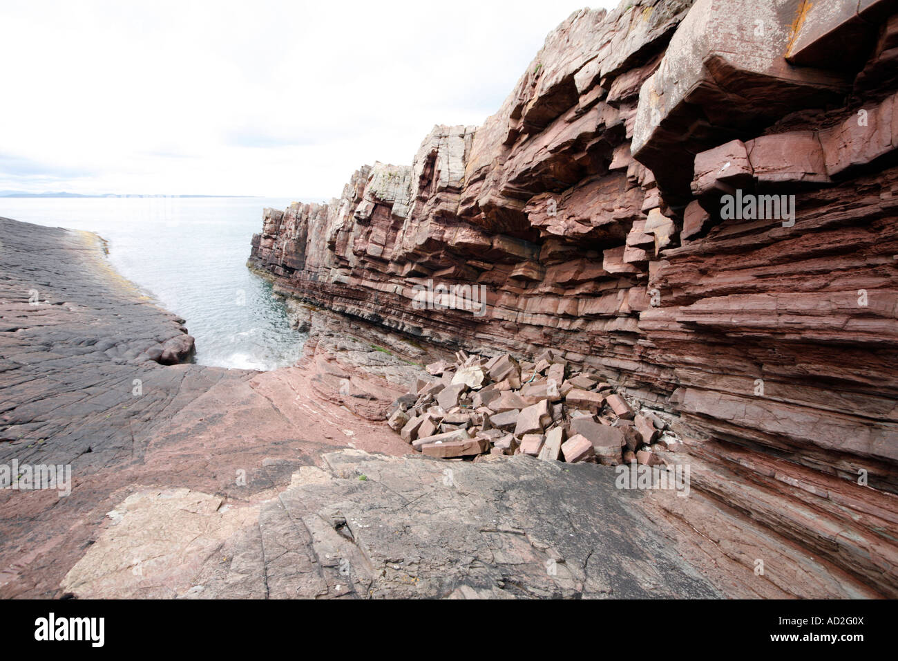 Layers of Torridonian sandstone with rock fall Stoer Bay Sutherland ...