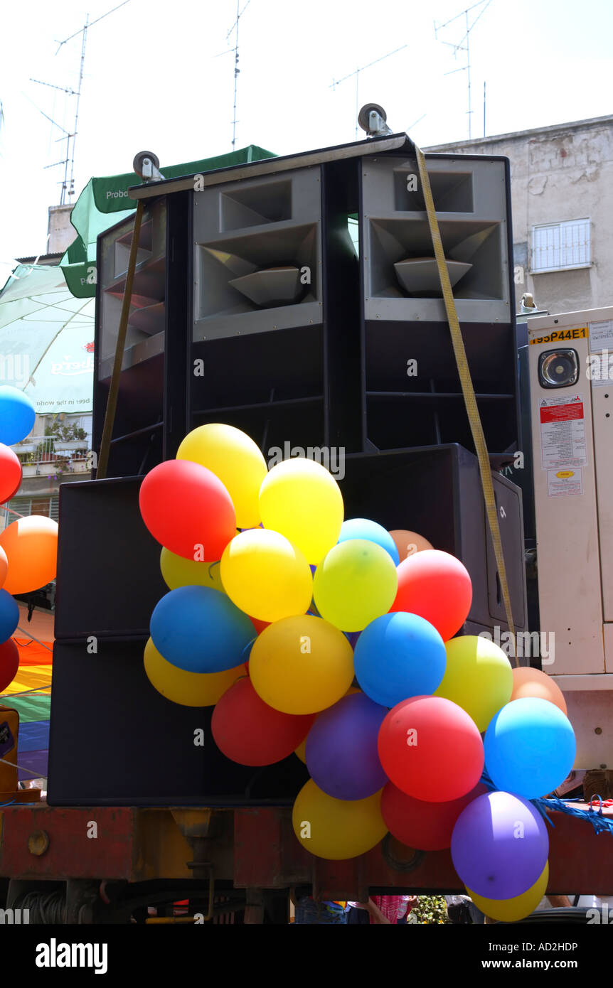 Large loud speaker decorated with balloons on a float during a festive ...