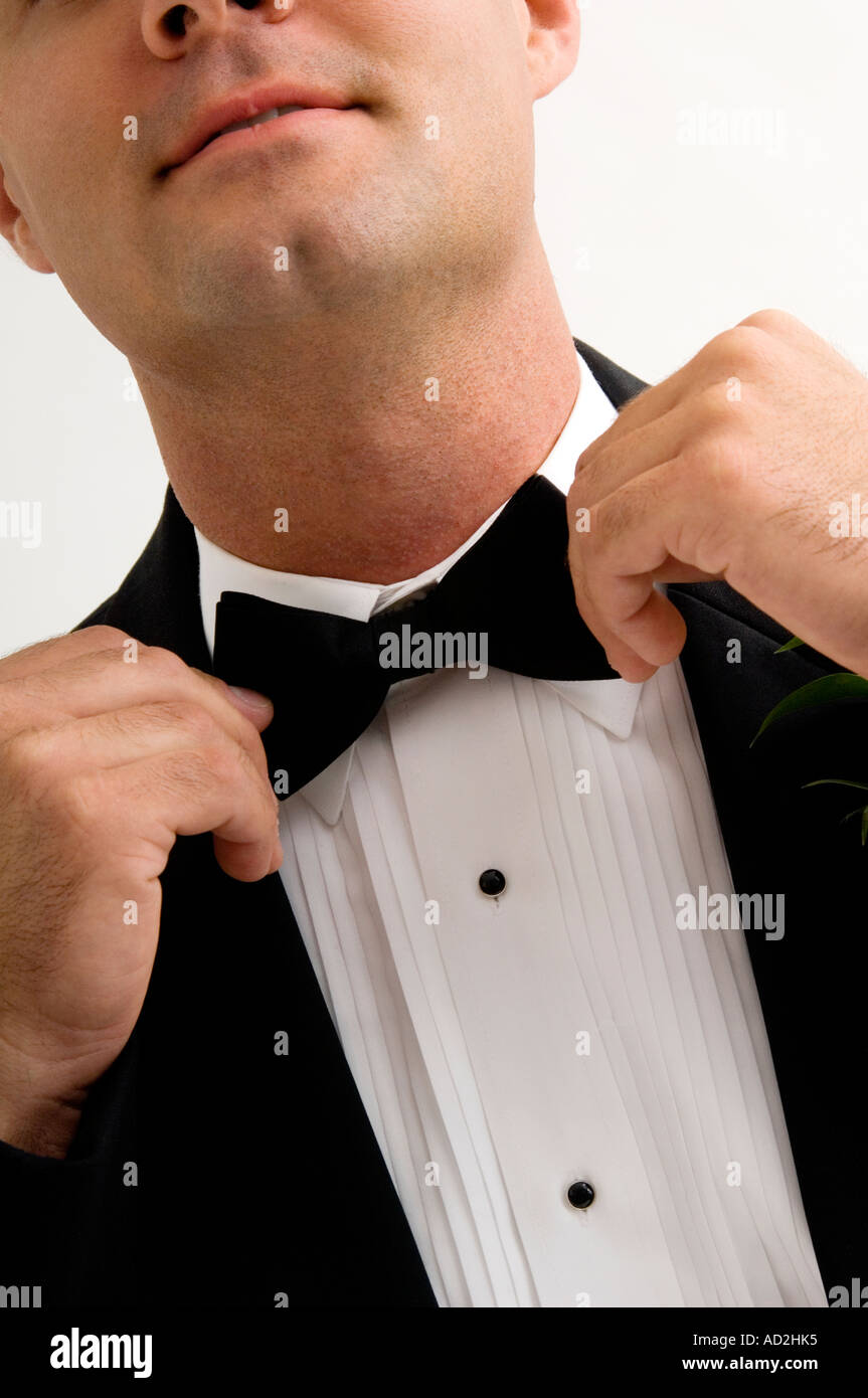 Straightening bow tie hi-res stock photography and images - Alamy