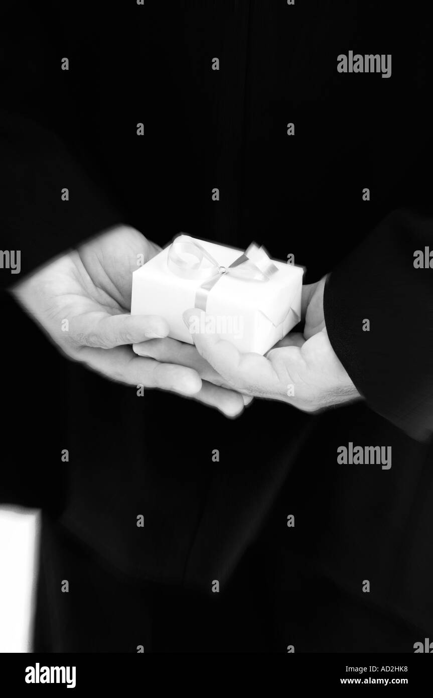 Holding behind back Black and White Stock Photos & Images - Alamy