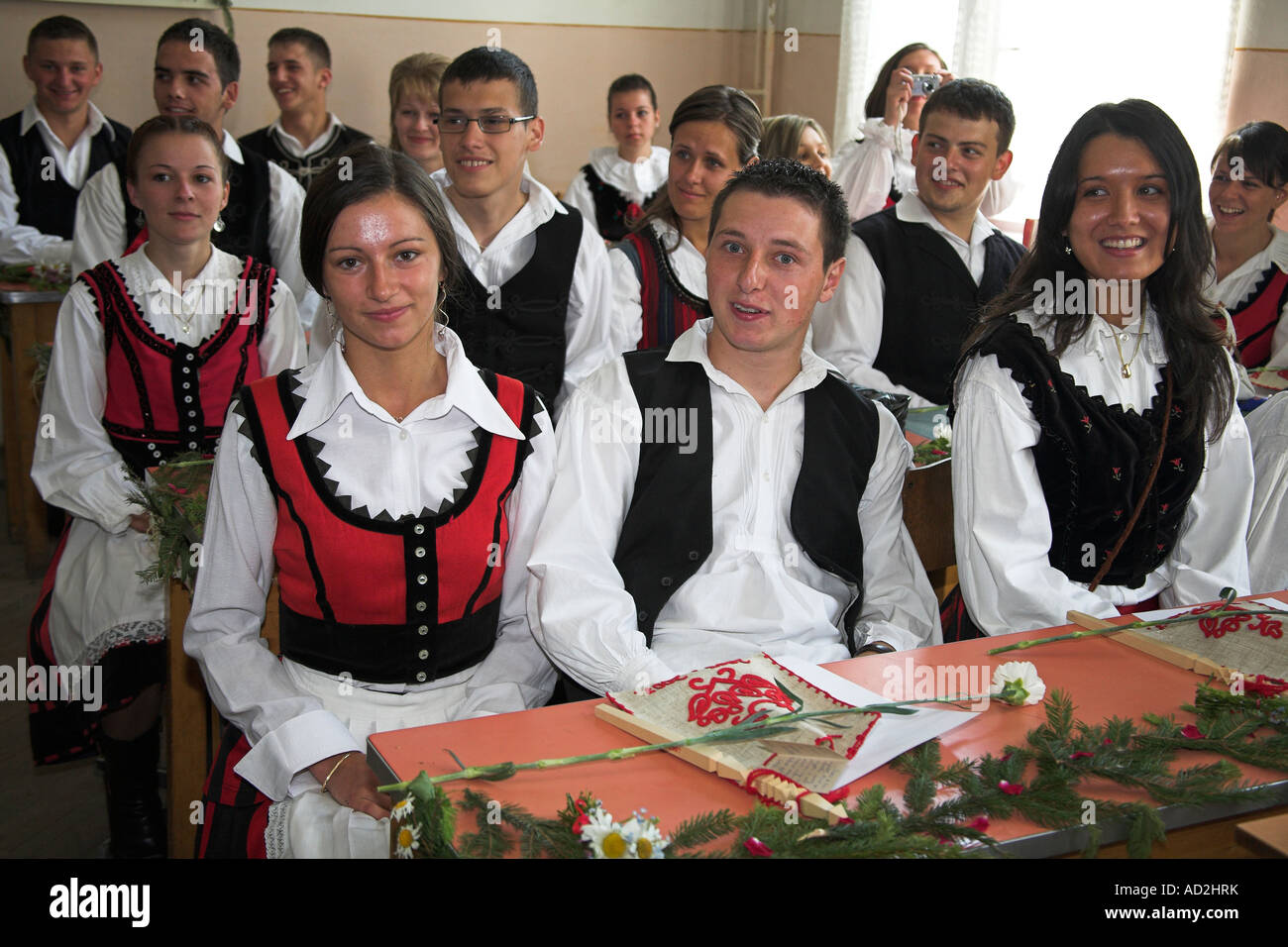 High school students in Hungarian national costume, in classroom ...
