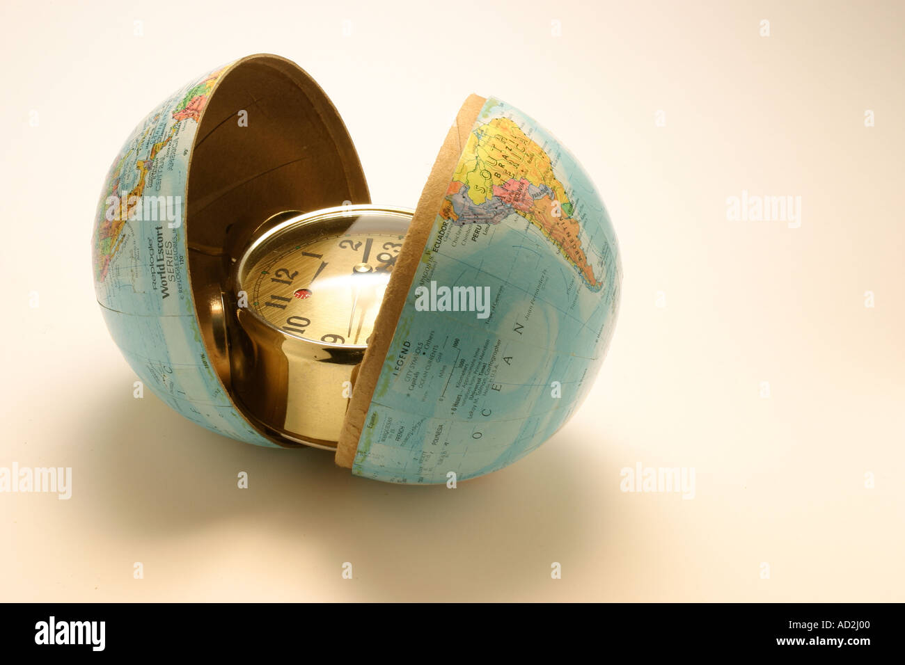 Globe Container with Alarm Clock Stock Photo - Alamy