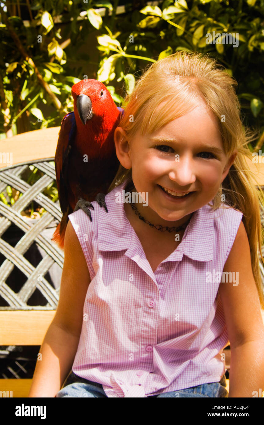 Girl with parrot hi-res stock photography and images - Alamy