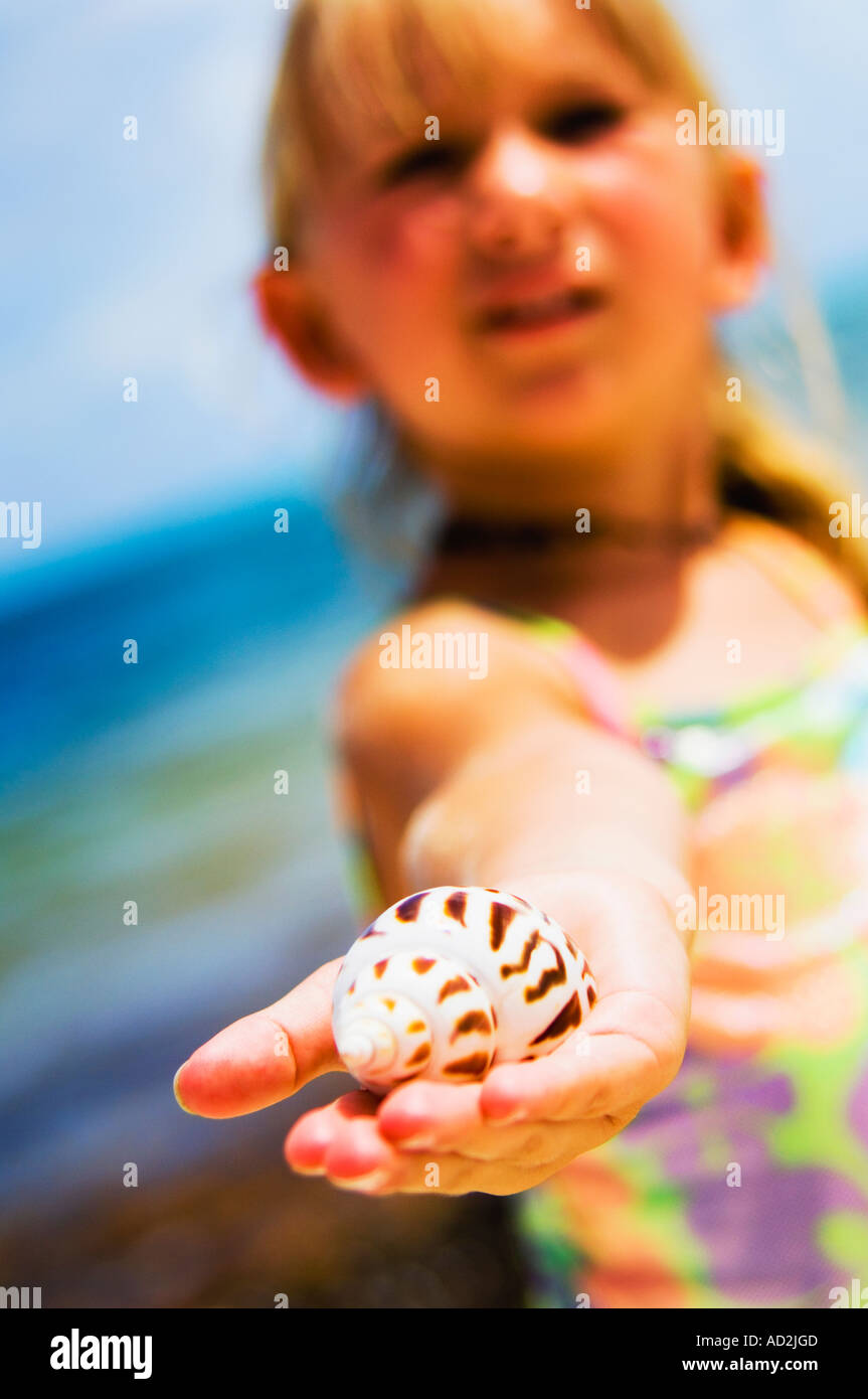 Sea shell discovering hi-res stock photography and images - Alamy