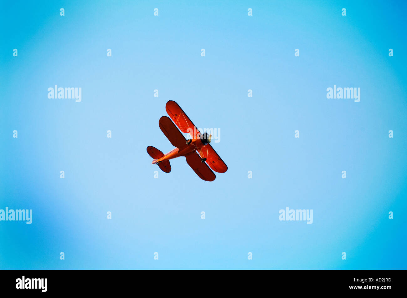 Red bi wing plane flying hi-res stock photography and images - Alamy