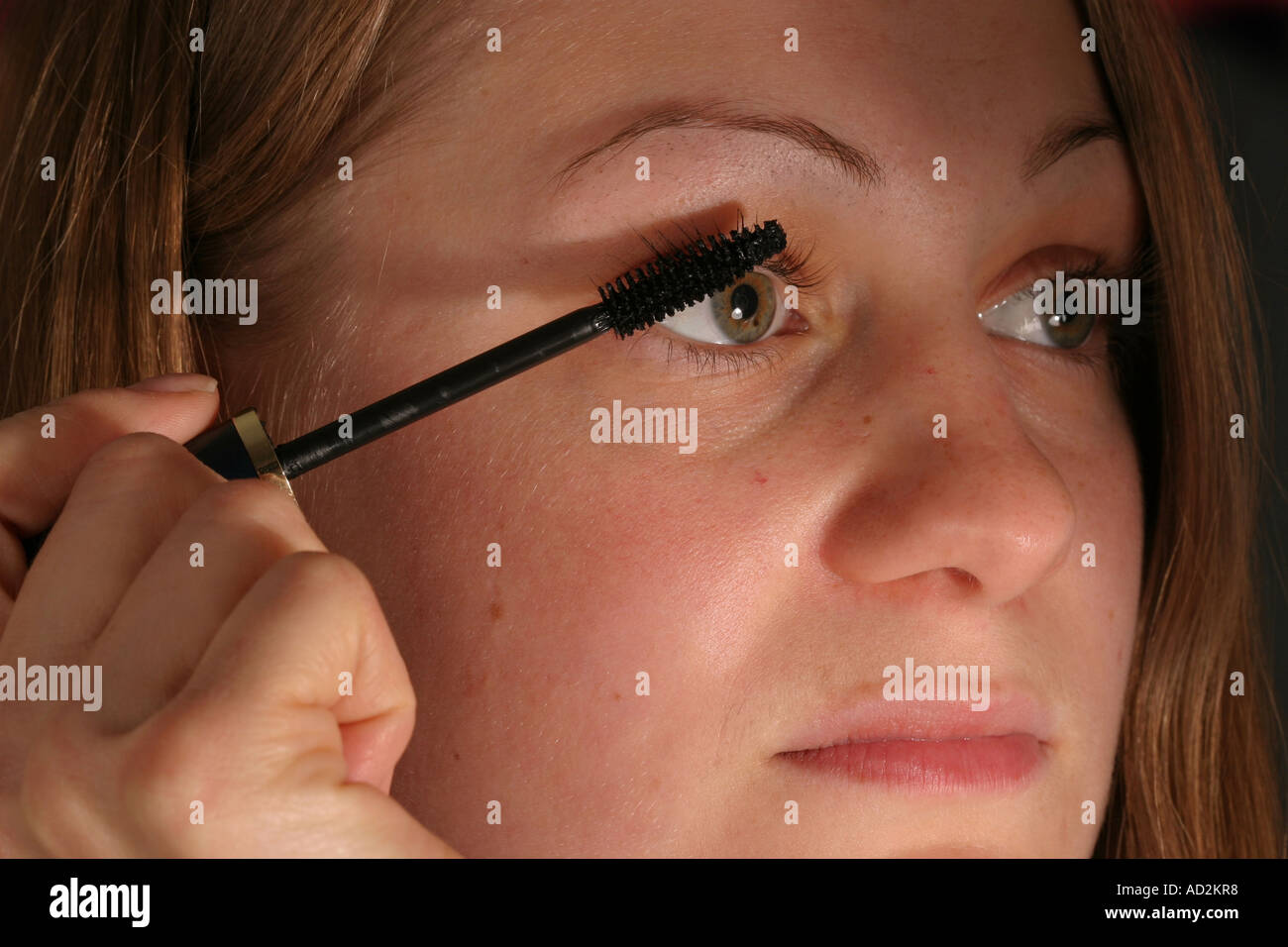 Female Applying Mascara Stock Photo - Alamy