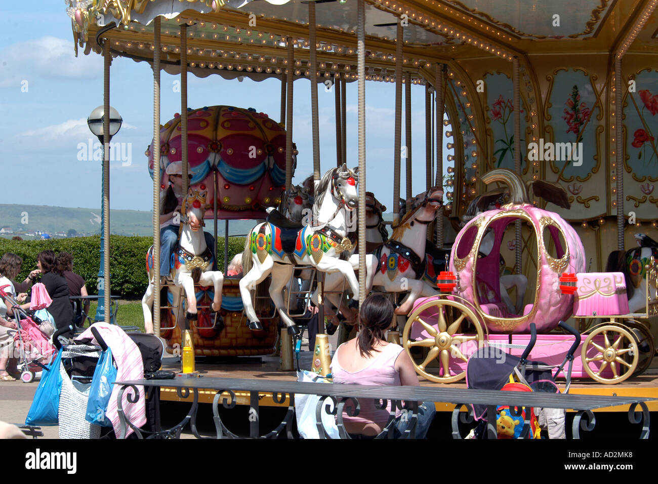 A carousel carnival ride Stock Photo - Alamy
