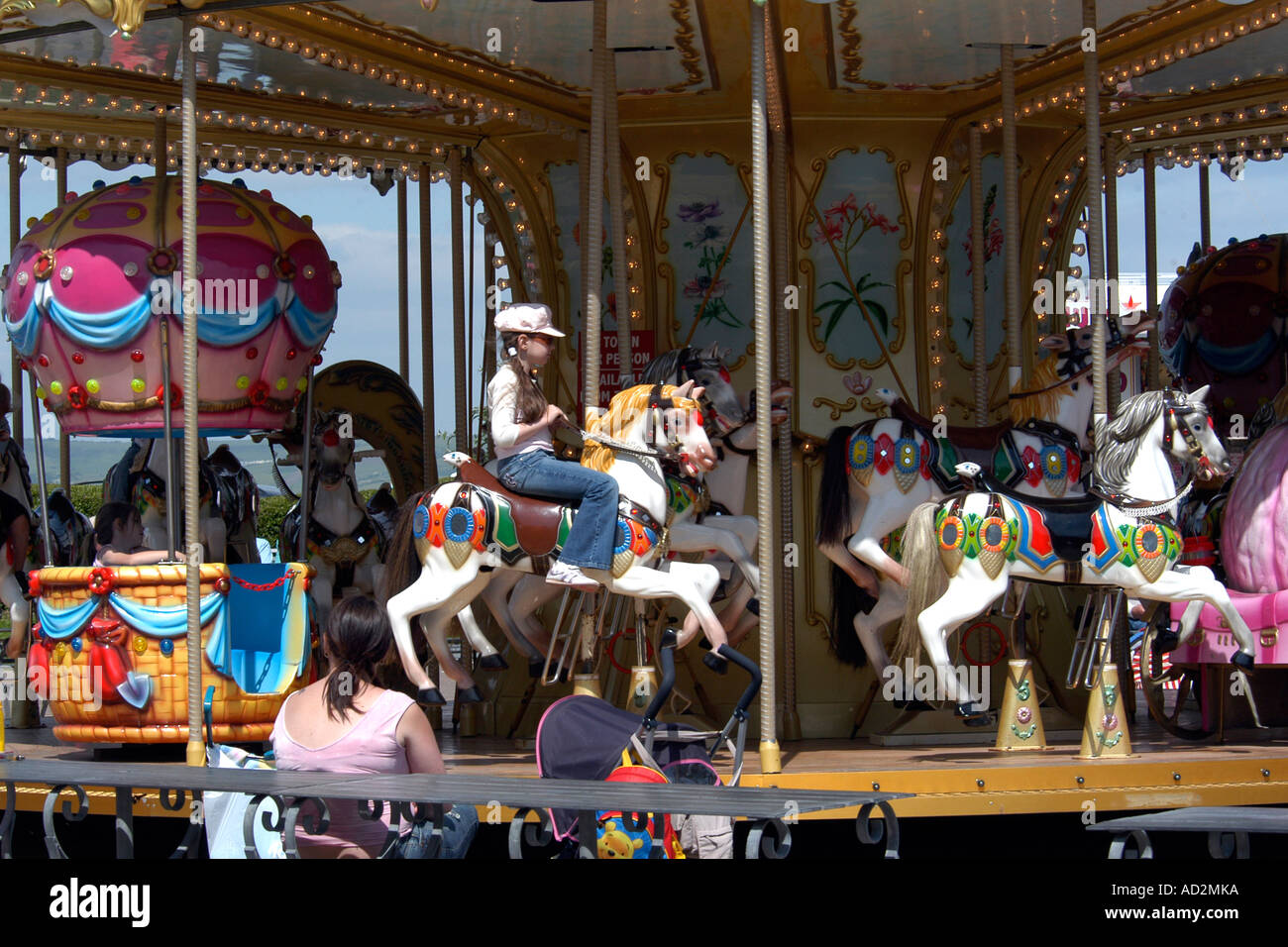 A carousel carnival ride Stock Photo - Alamy
