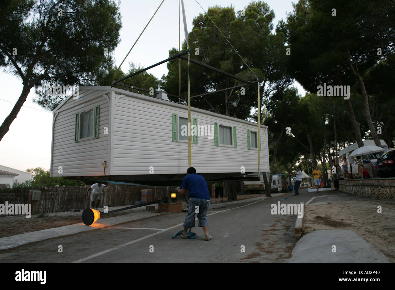Lifting a static caravan into position Spain Stock Photo - Alamy