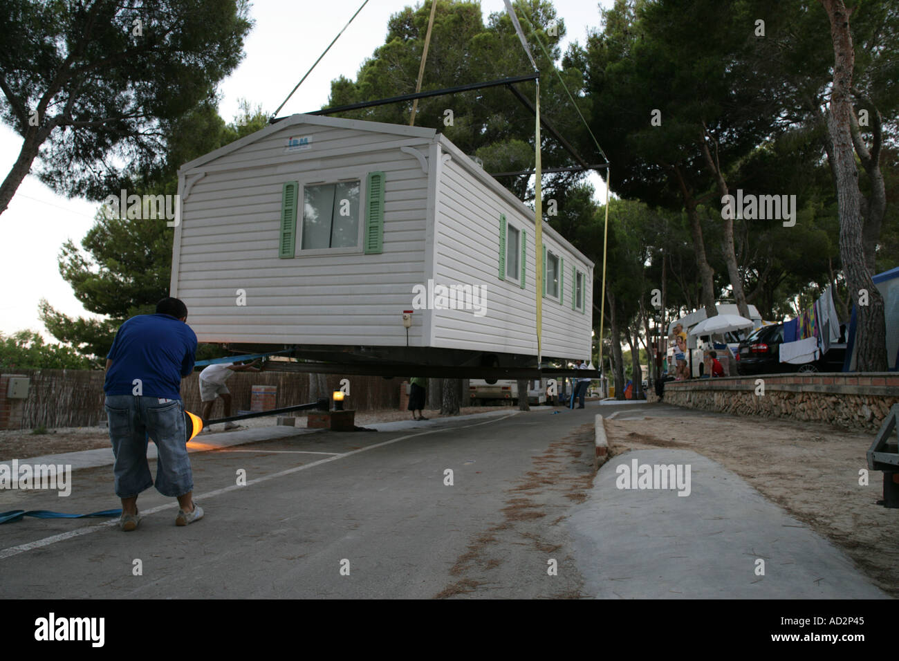 Lifting a static caravan into position Spain Stock Photo - Alamy
