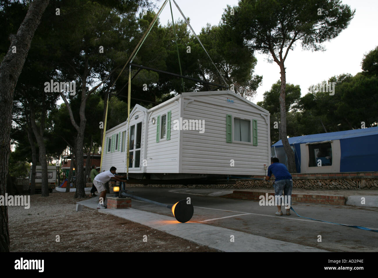 Lifting a static caravan into position spain Stock Photo - Alamy