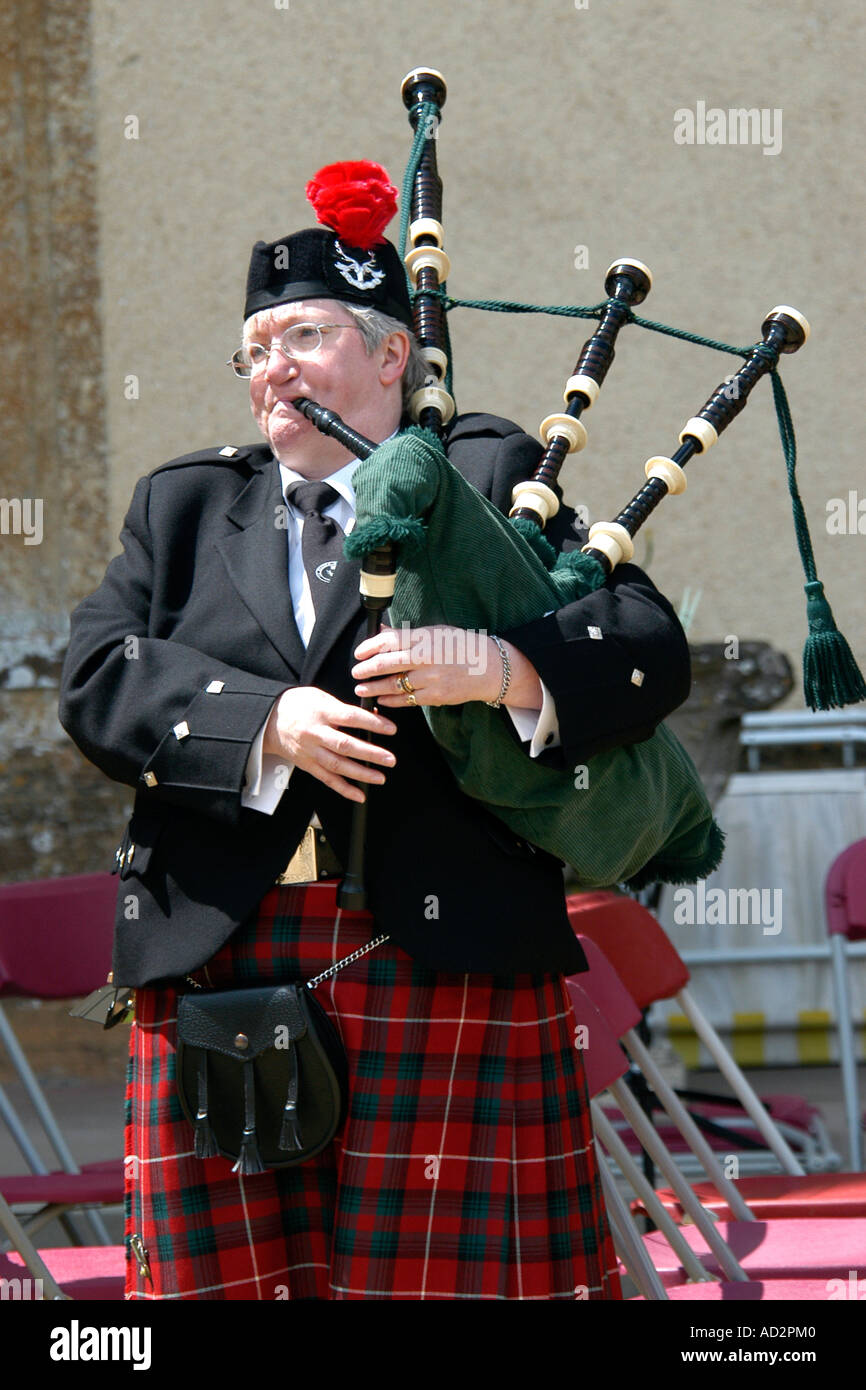 Female Scottish Piper at a music festival in the Highlands of Scotland ...