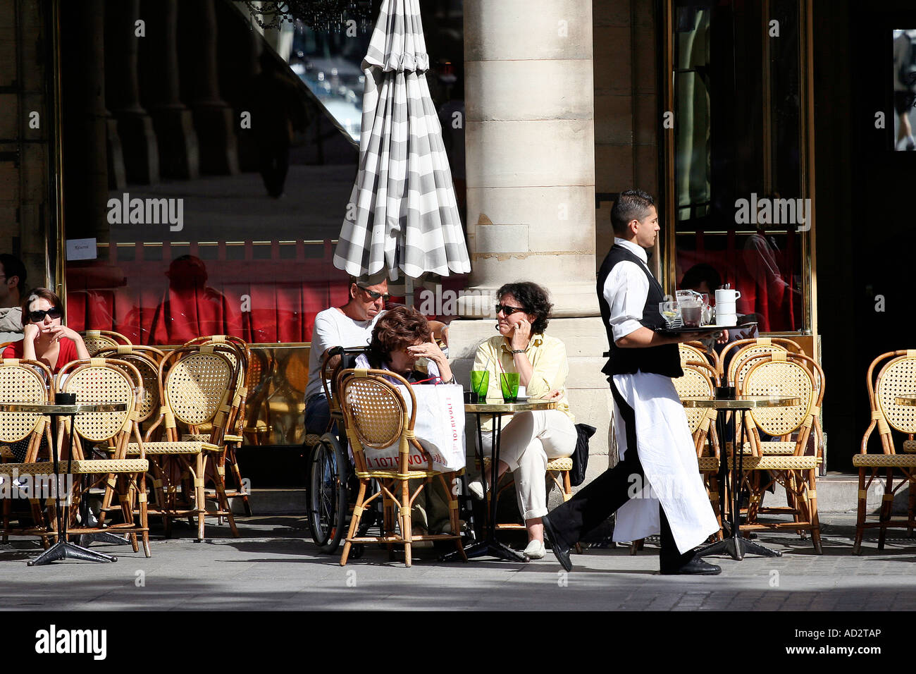 People sitting outside at Cafe in Paris, France Stock Photo - Alamy