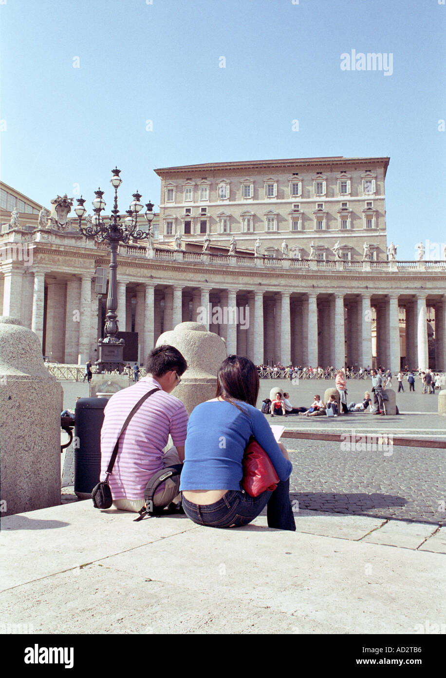two young tourists sitting in st peters square rome italy Stock Photo ...