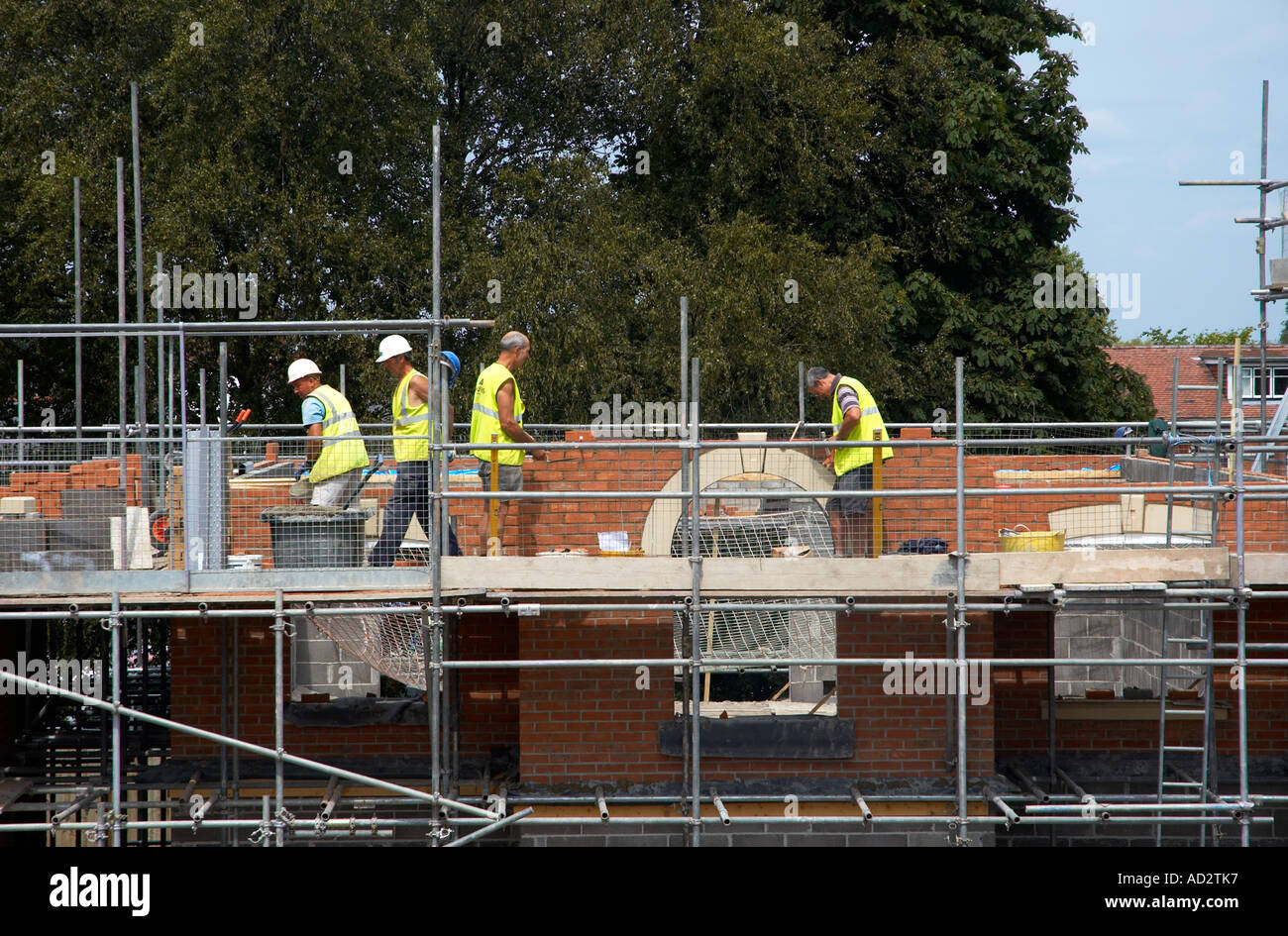 Construction Workers on a Housing Development Stock Photo - Alamy
