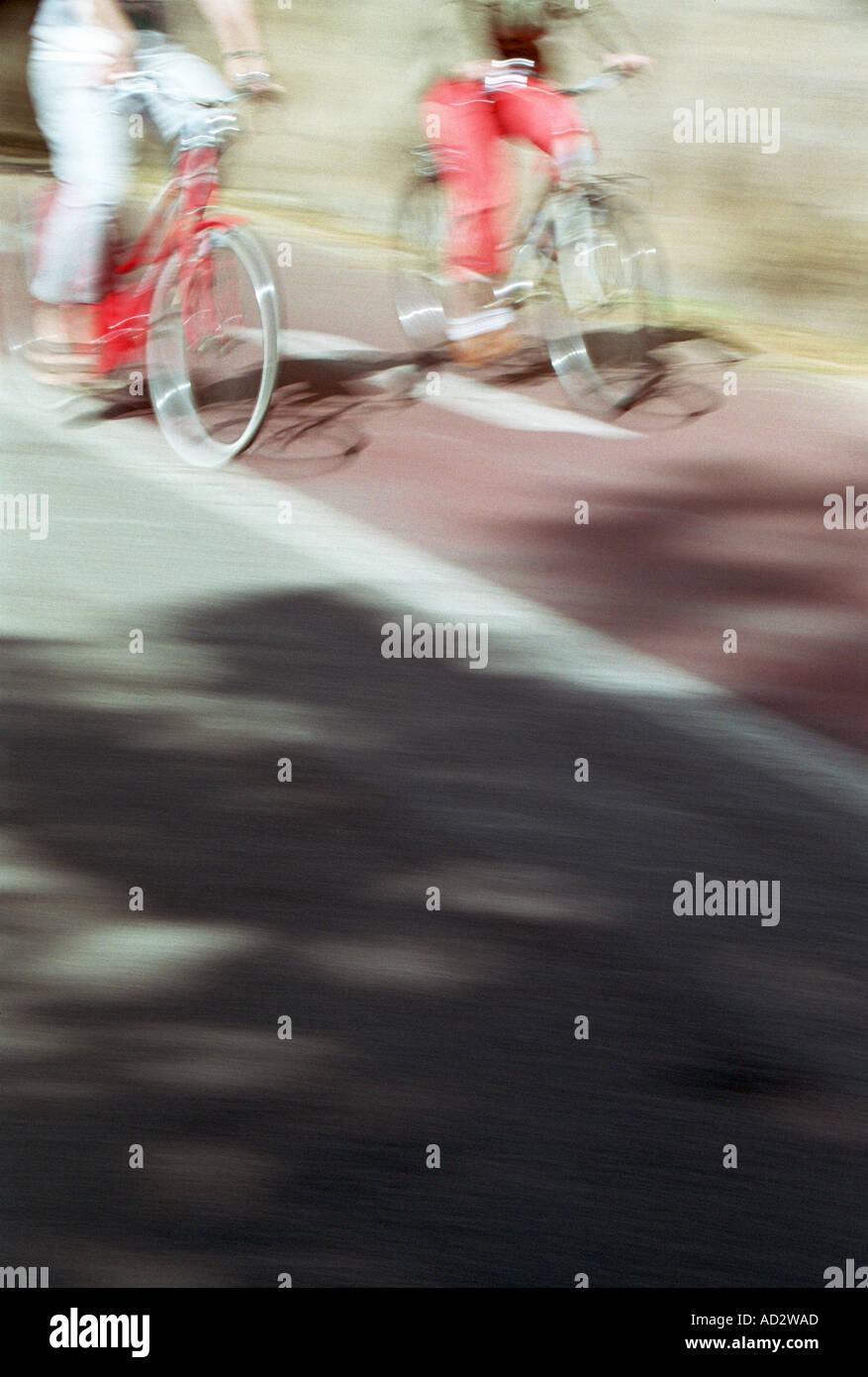 Two cyclists passing road hi-res stock photography and images - Alamy