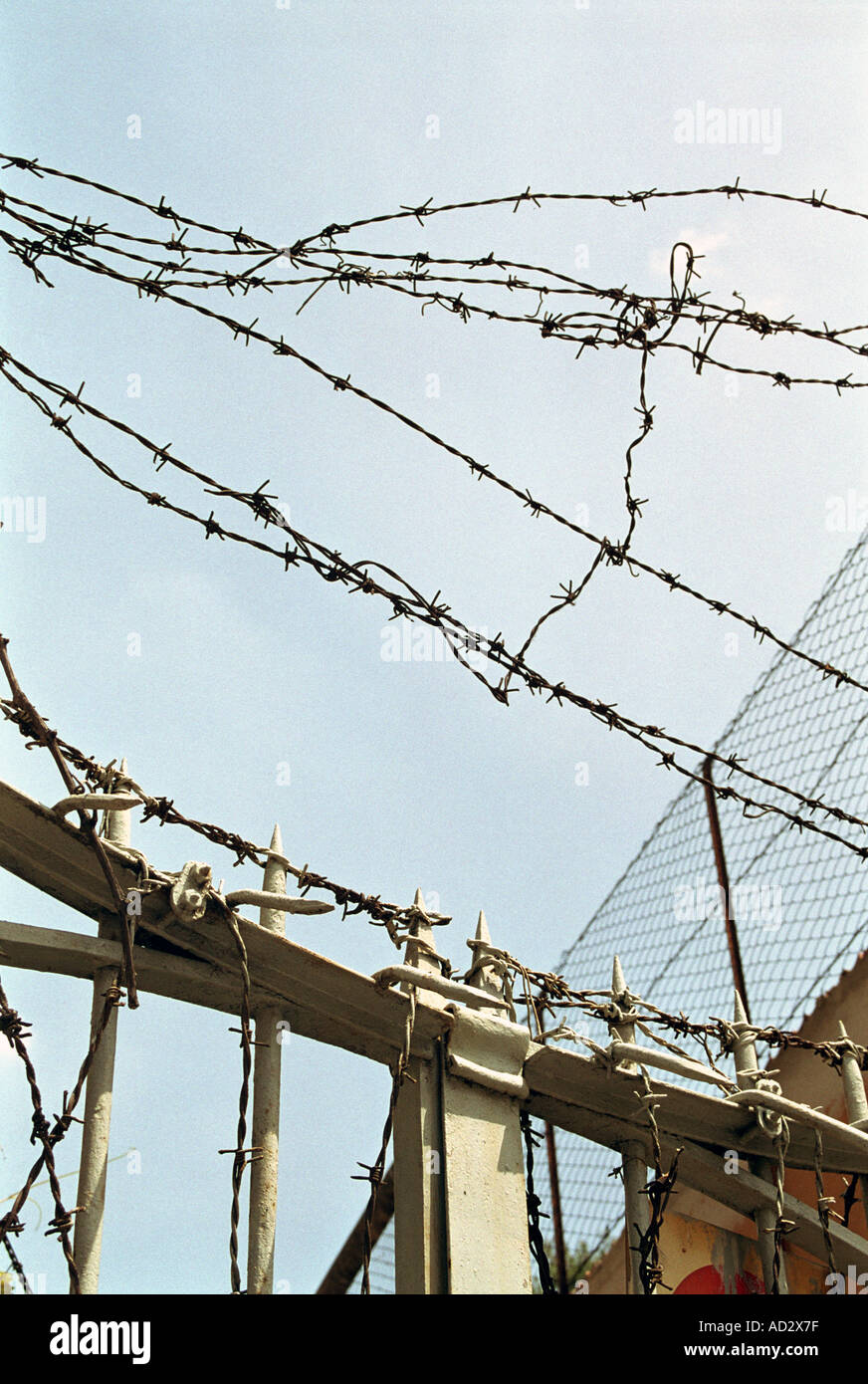 gate with fence and barbed wire Stock Photo - Alamy