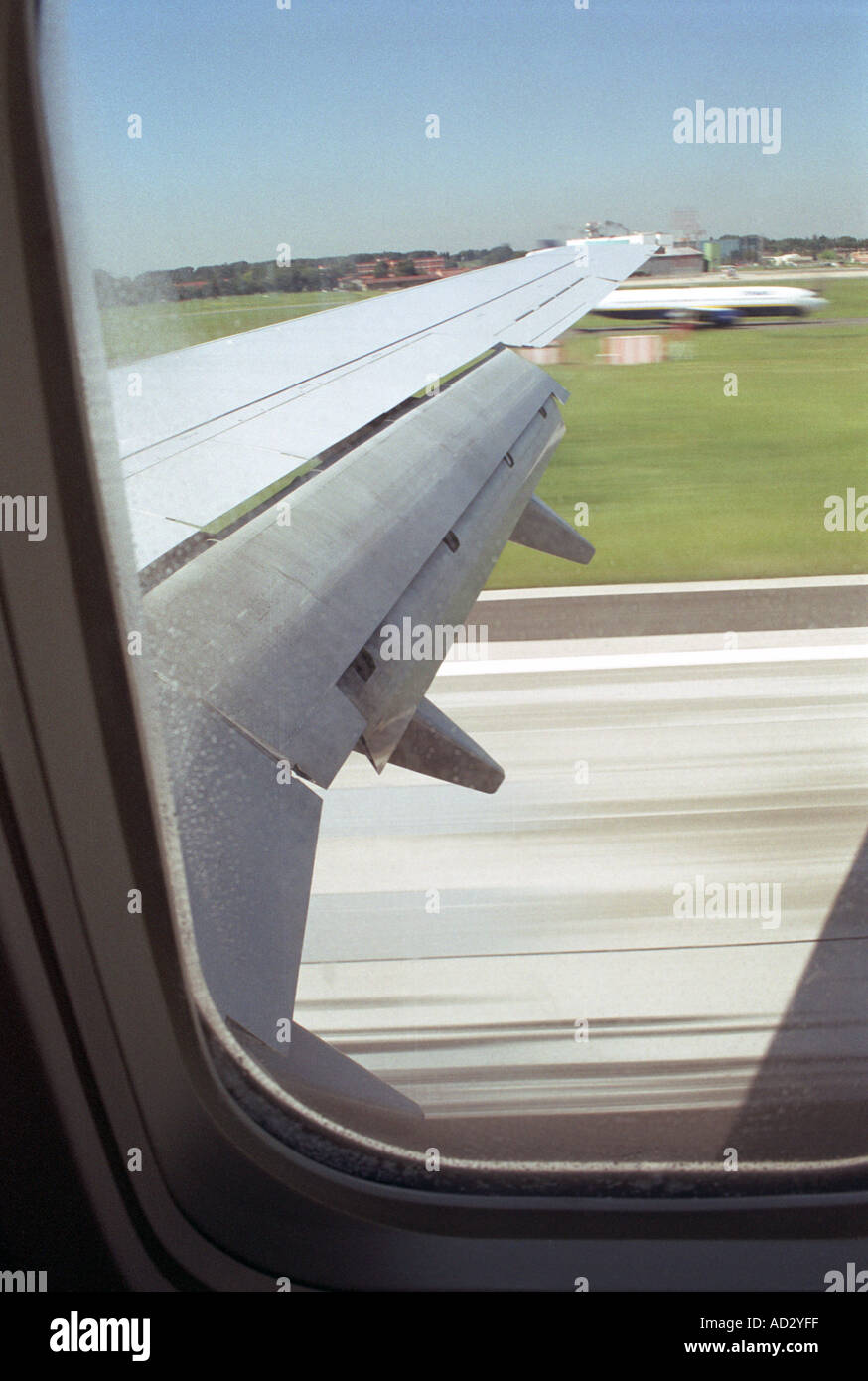 view of wing from plane window landing movement Stock Photo - Alamy