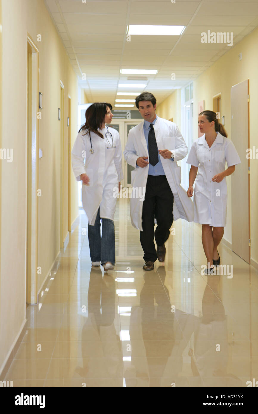 Medical staff running in hospital corridor Stock Photo - Alamy