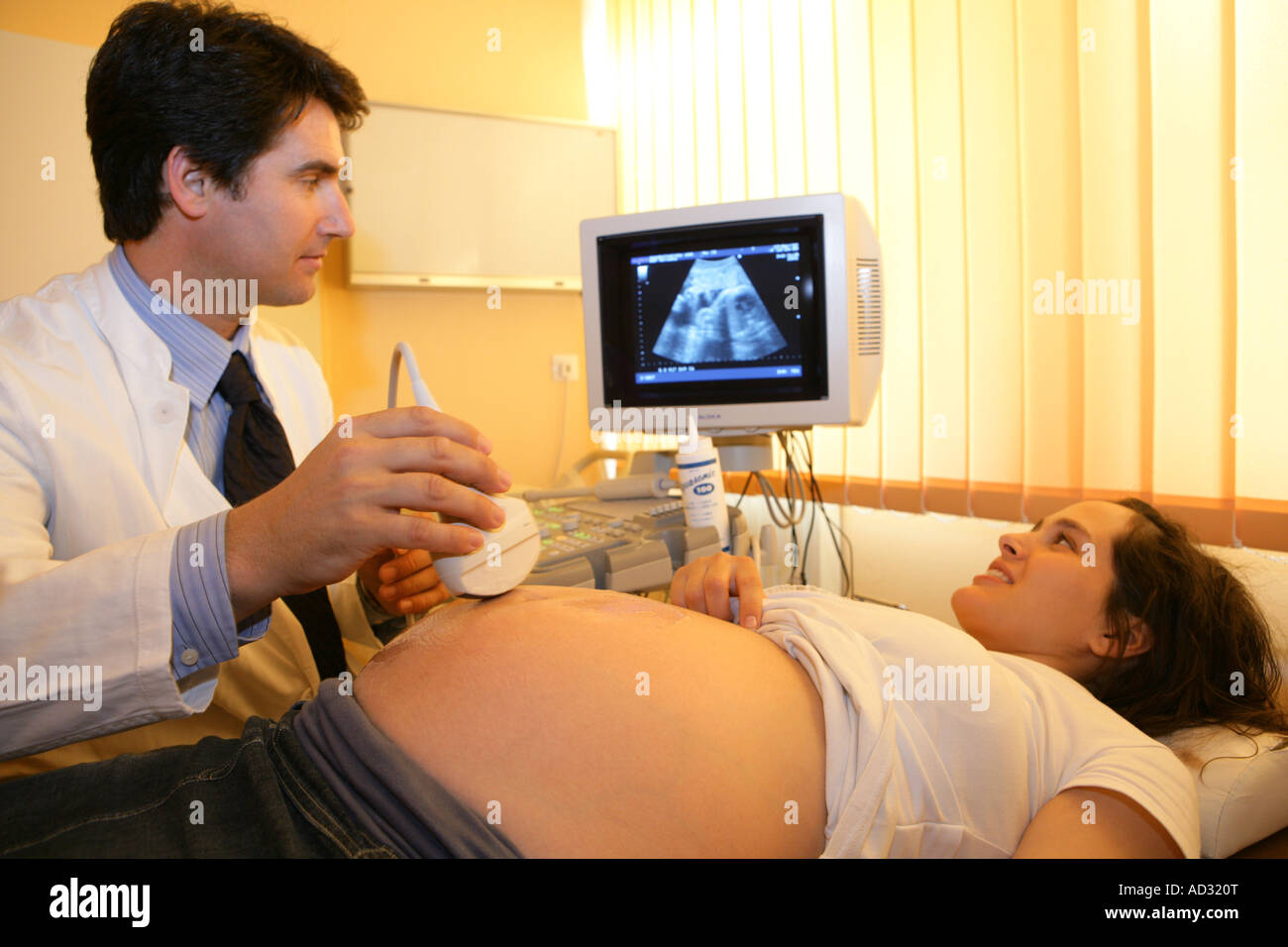 pregnant woman getting an ultrasound checkup Stock Photo - Alamy