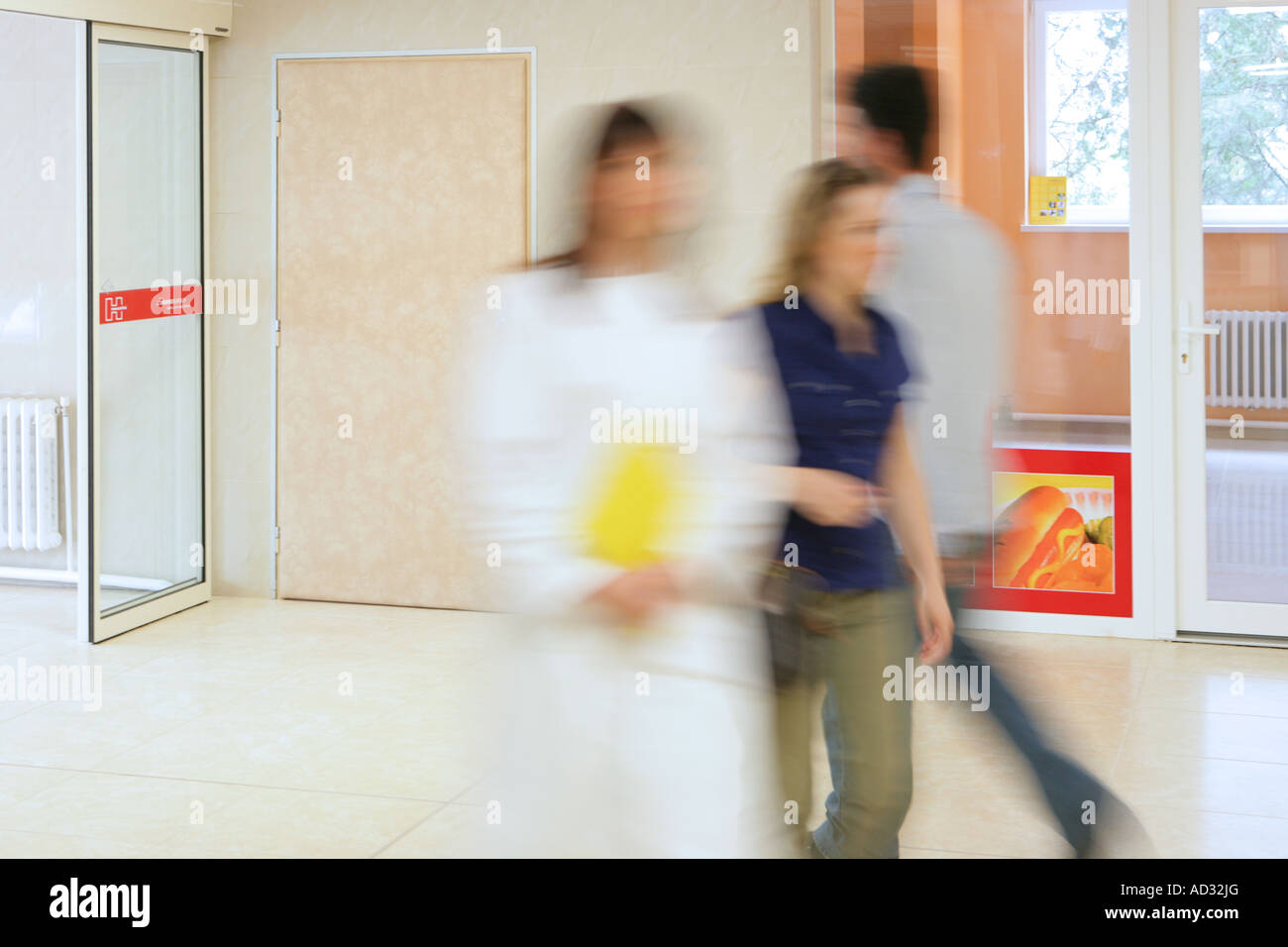 people walking in hospital corridor Stock Photo - Alamy