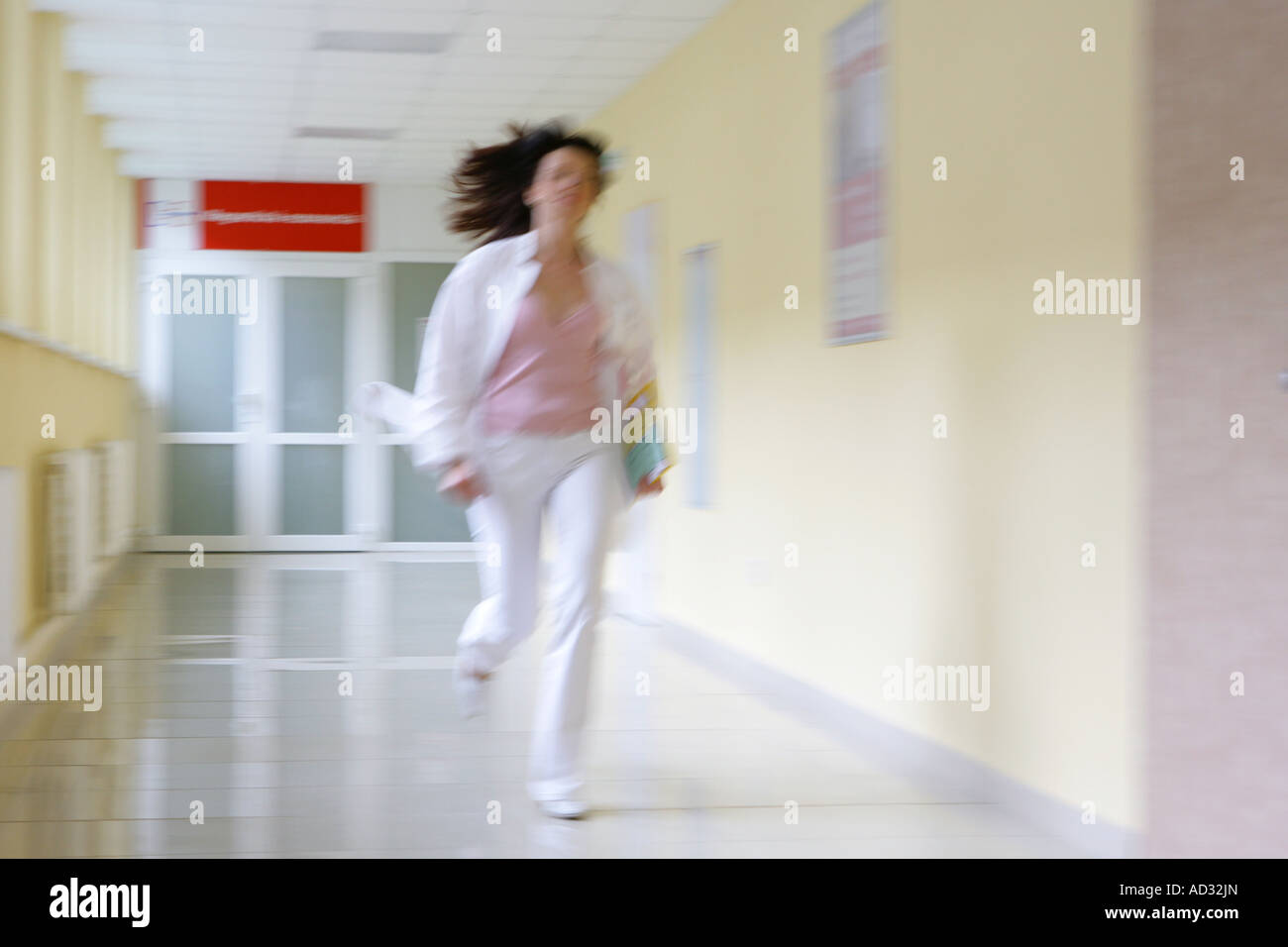 Doctor running in corridor hi-res stock photography and images - Alamy
