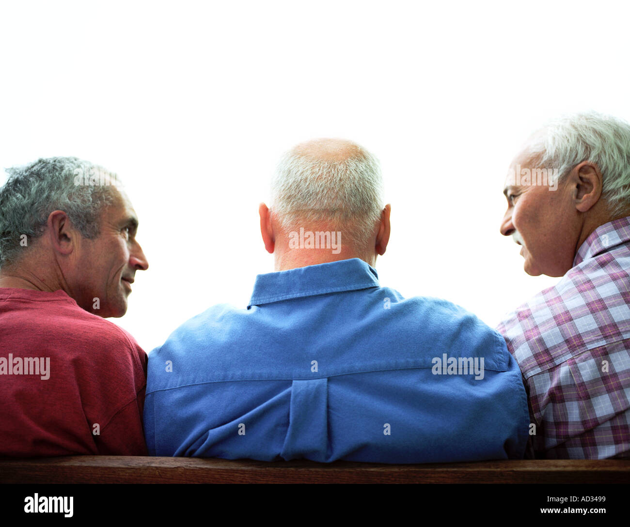 3 men having conversation Stock Photo - Alamy