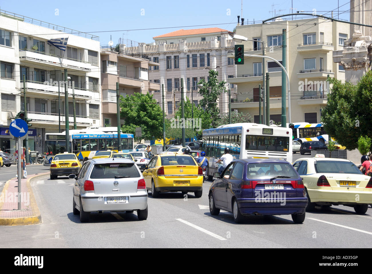 Athens Greece cars and single deck bus in slow moving traffic queue on ...