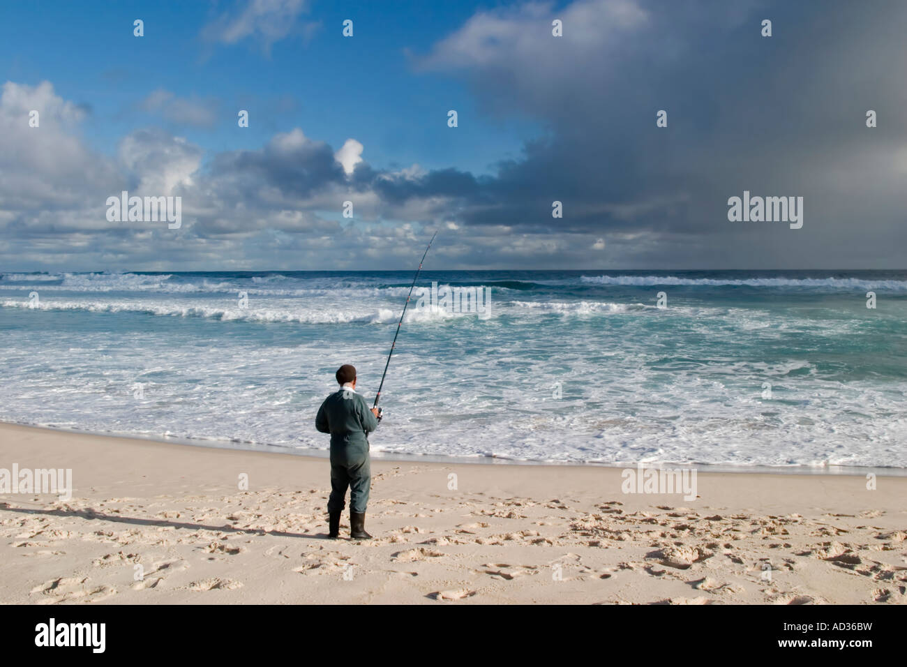 Sea fishing on the beach Stock Photo - Alamy