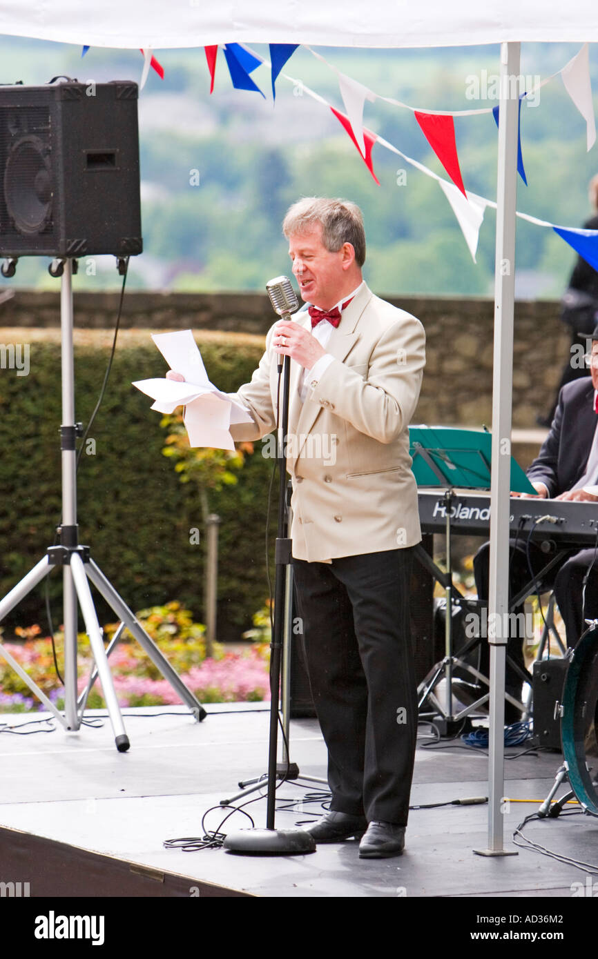 1940's Swing Bandmaster announcing with microphone at reenactment ...
