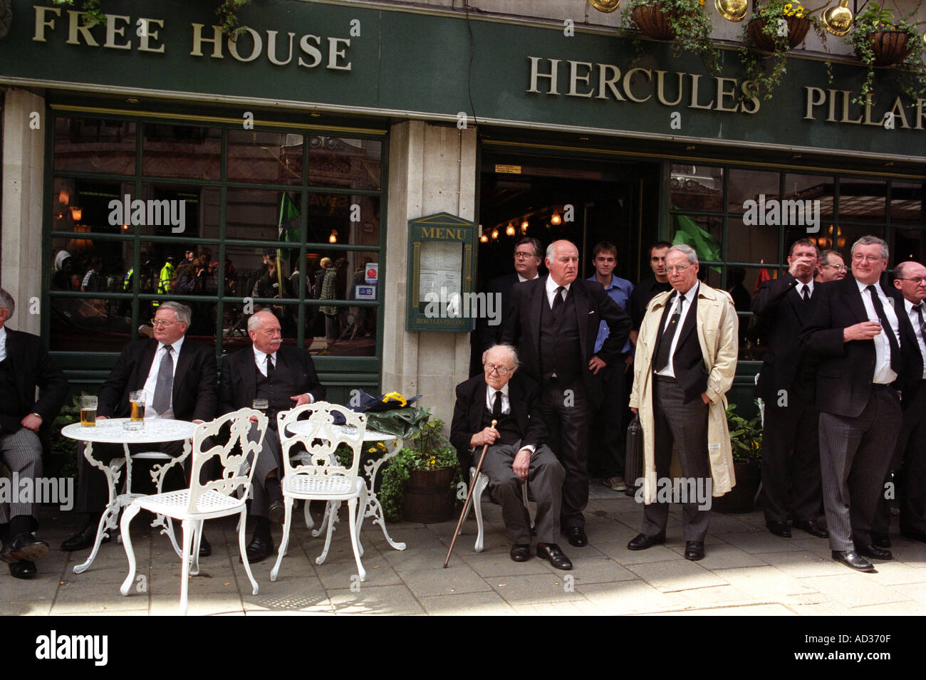London pub at lunch time with older men drinking Stock Photo - Alamy