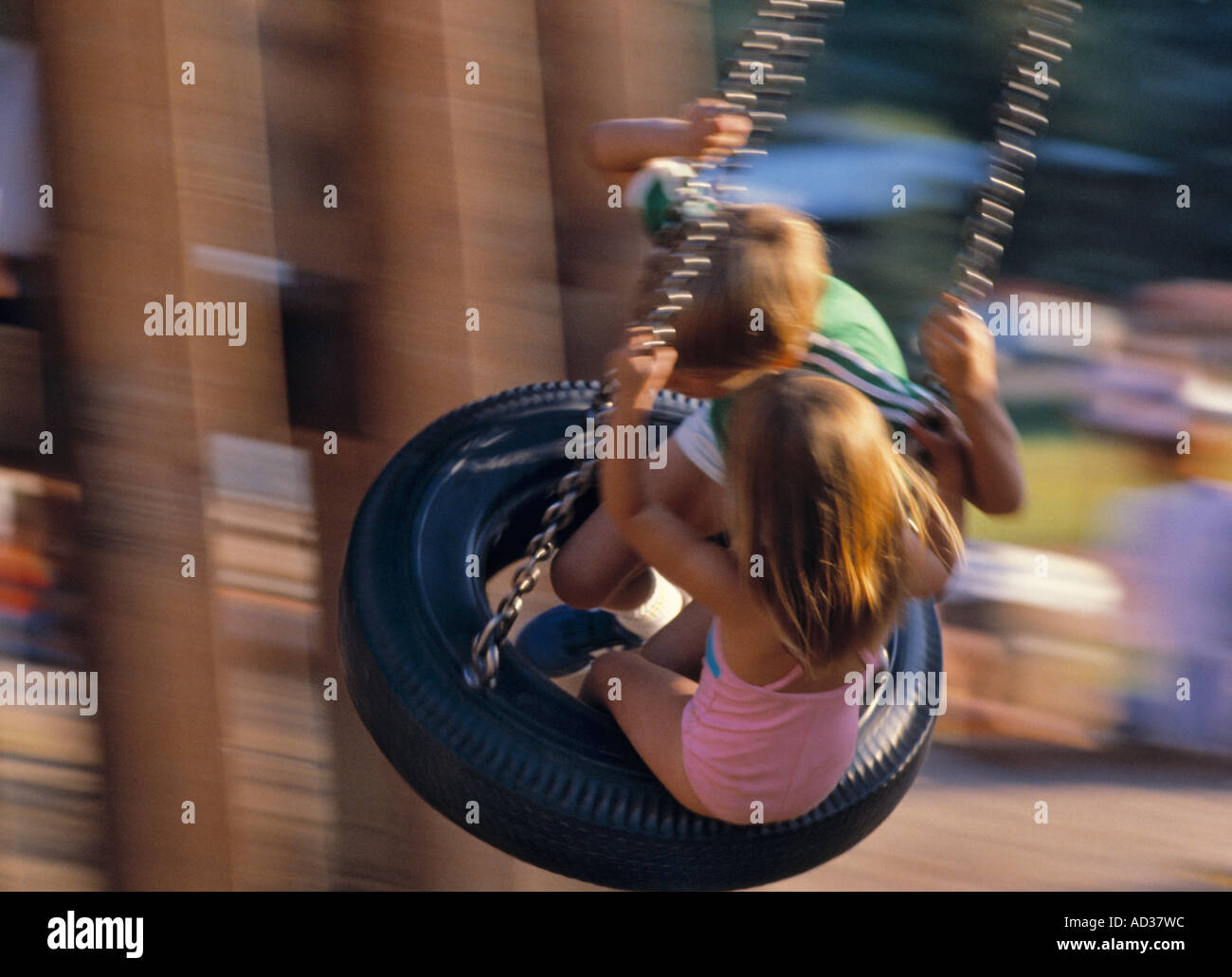 Children swing blur motion hi-res stock photography and images - Alamy
