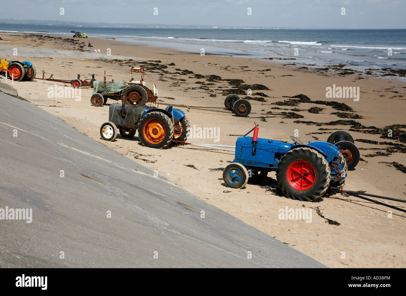 Tractors on Beach at Redcar North Yorkshire Stock Photo - Alamy
