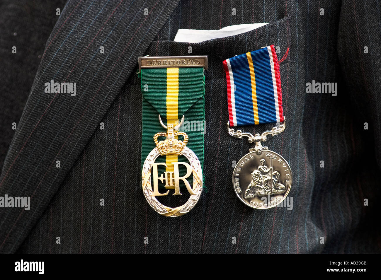 Medals pinned to an old soliders chest Stock Photo - Alamy