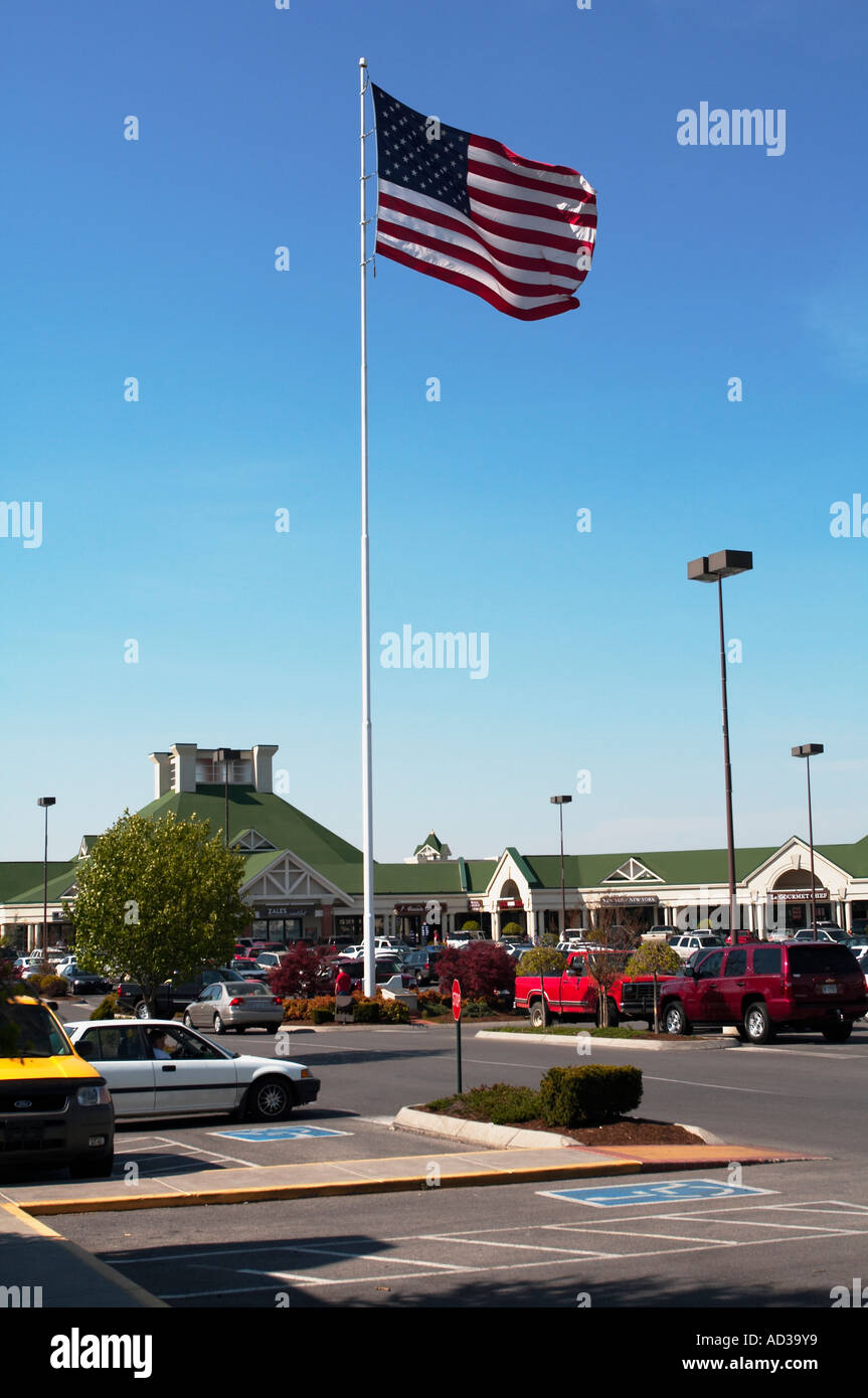A shopping center in the United States with an American flag Stock ...