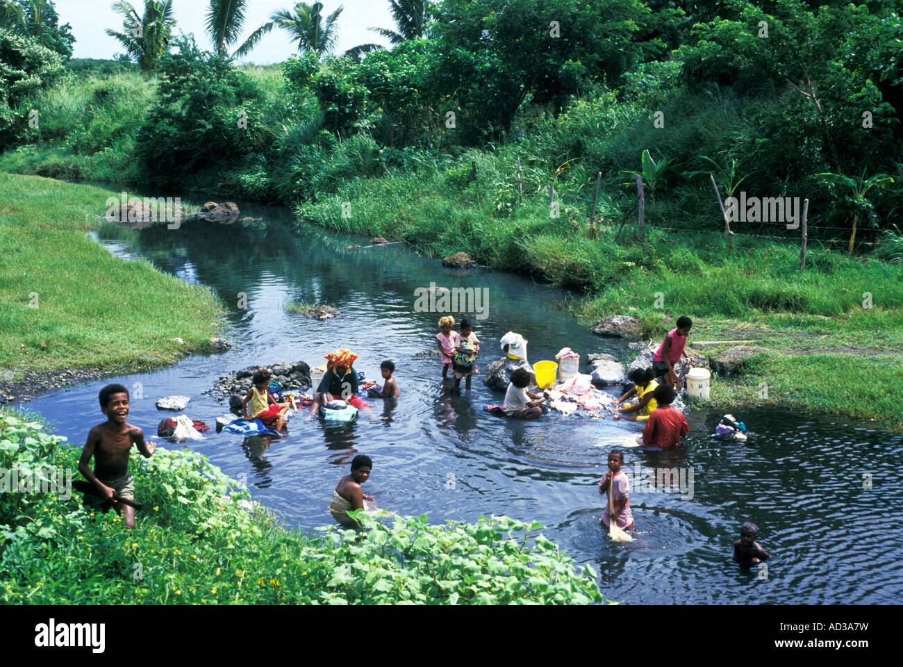 washing scene, queens road, viti levu, fiji Stock Photo - Alamy