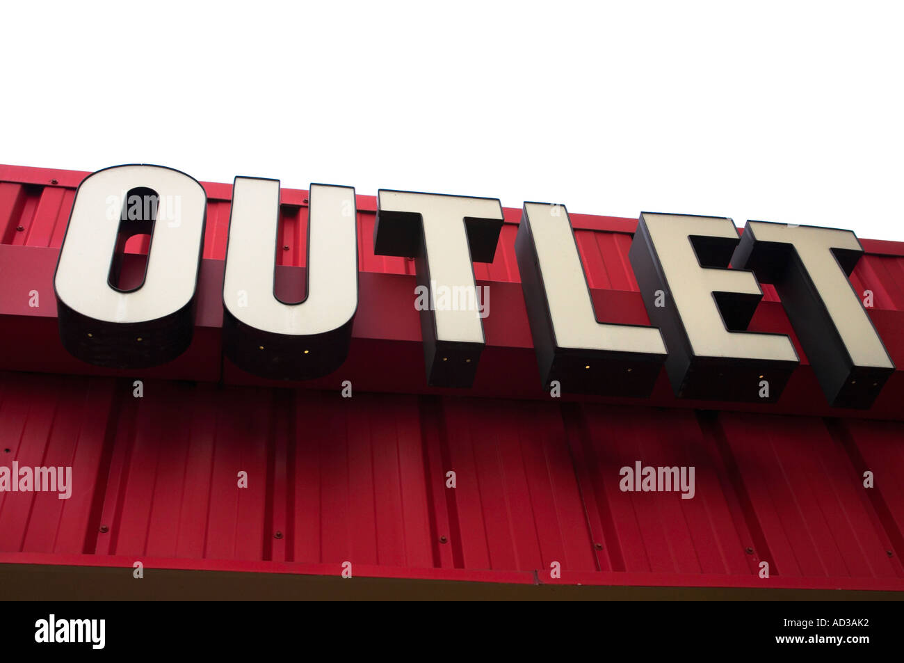 An outlet store sign Stock Photo - Alamy