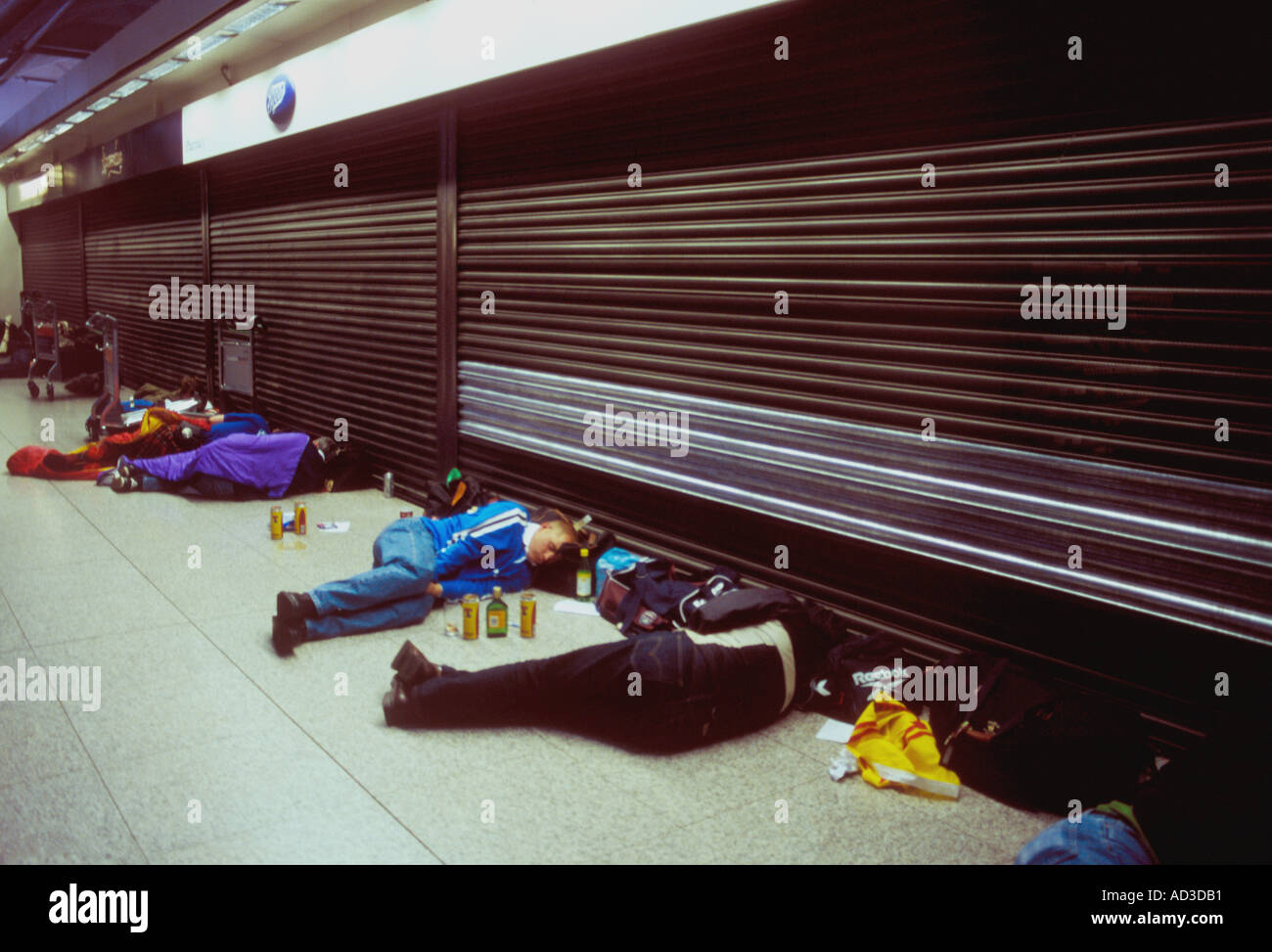 Passengers having to sleep on floor of Stansted airport due to delayed ...