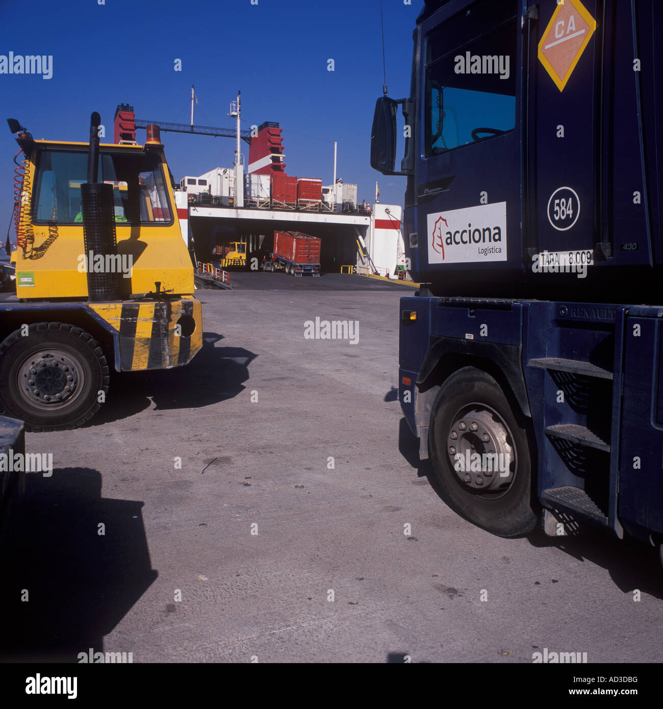 Cargo operations, lorries and containers being loaded onto ferries in ...