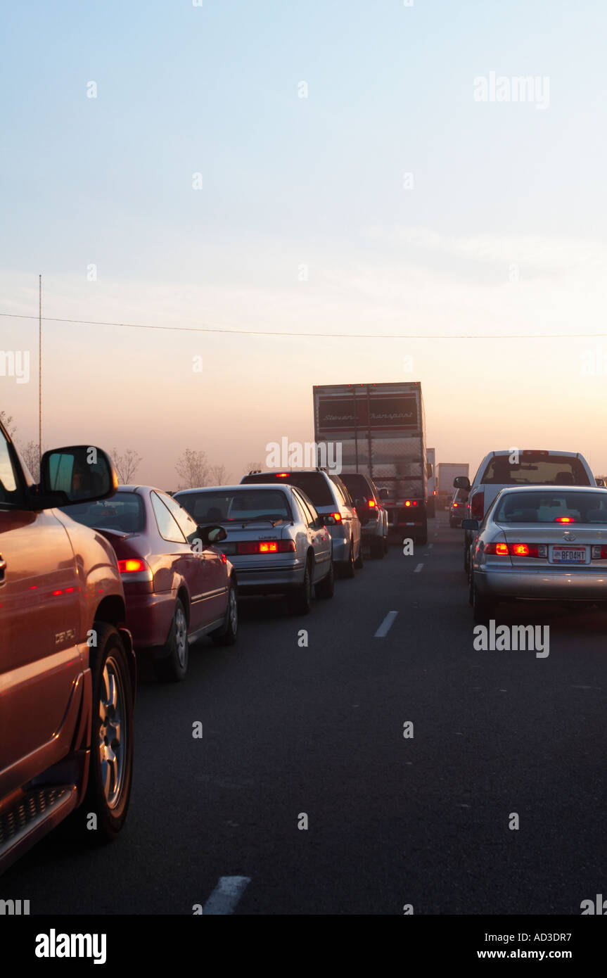 Cars and trucks stopped in a traffic jam on a United States interstate ...