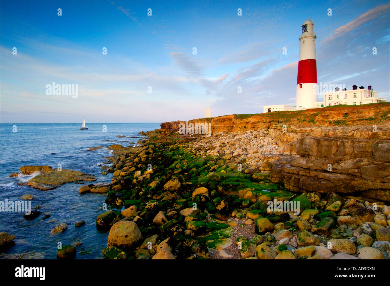 Portland Bill lighthouse at dawn taken from the clifftop above the ...